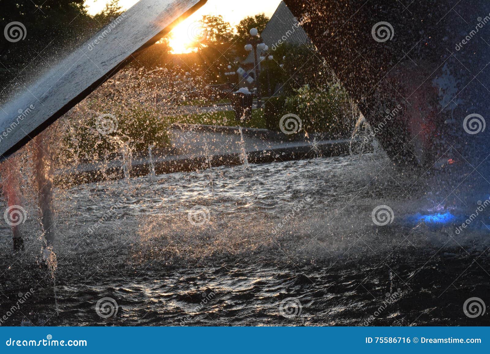Sun through Fountain stock photo. Image of water, lights - 75586716