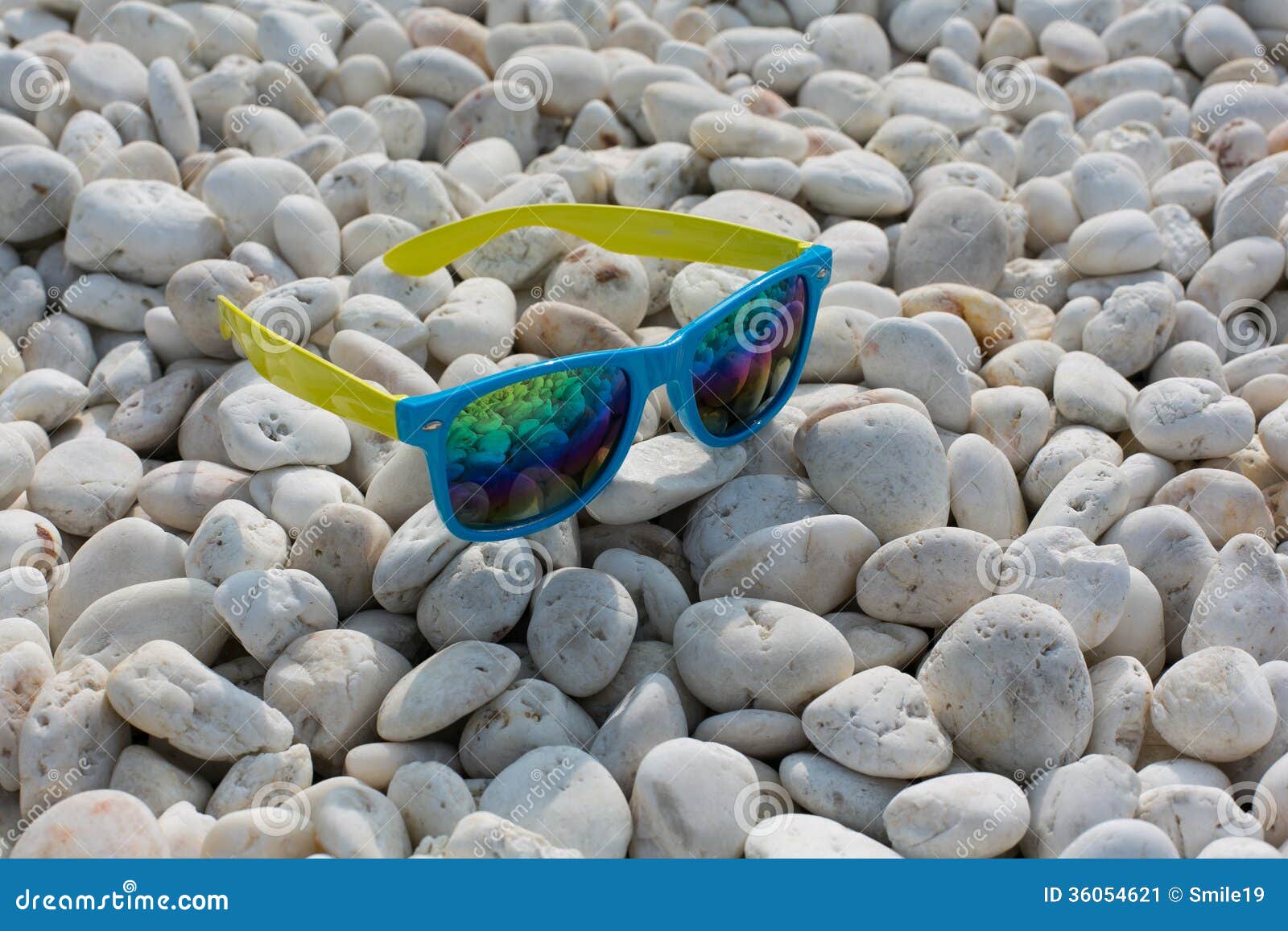 Sun glasse on the stones stock image. Image of modern - 36054621