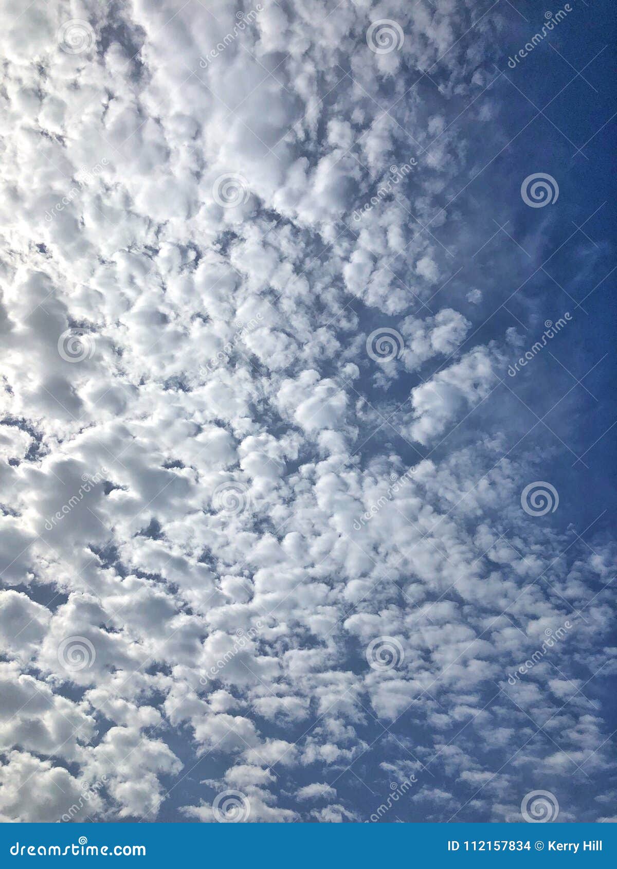 Sun glow behind clouds stock photo. Image of clouds - 112157834