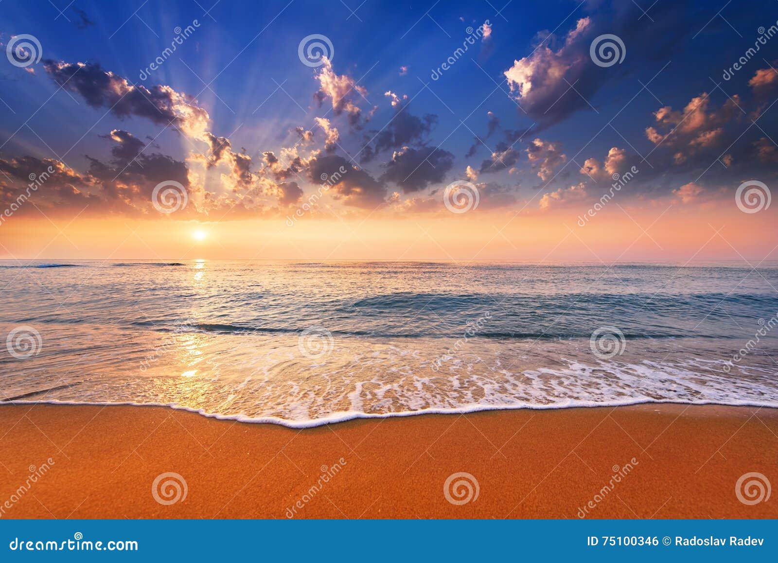 Sun goes down at sea. stock photo. Image of cloudy, panoramic - 75100346