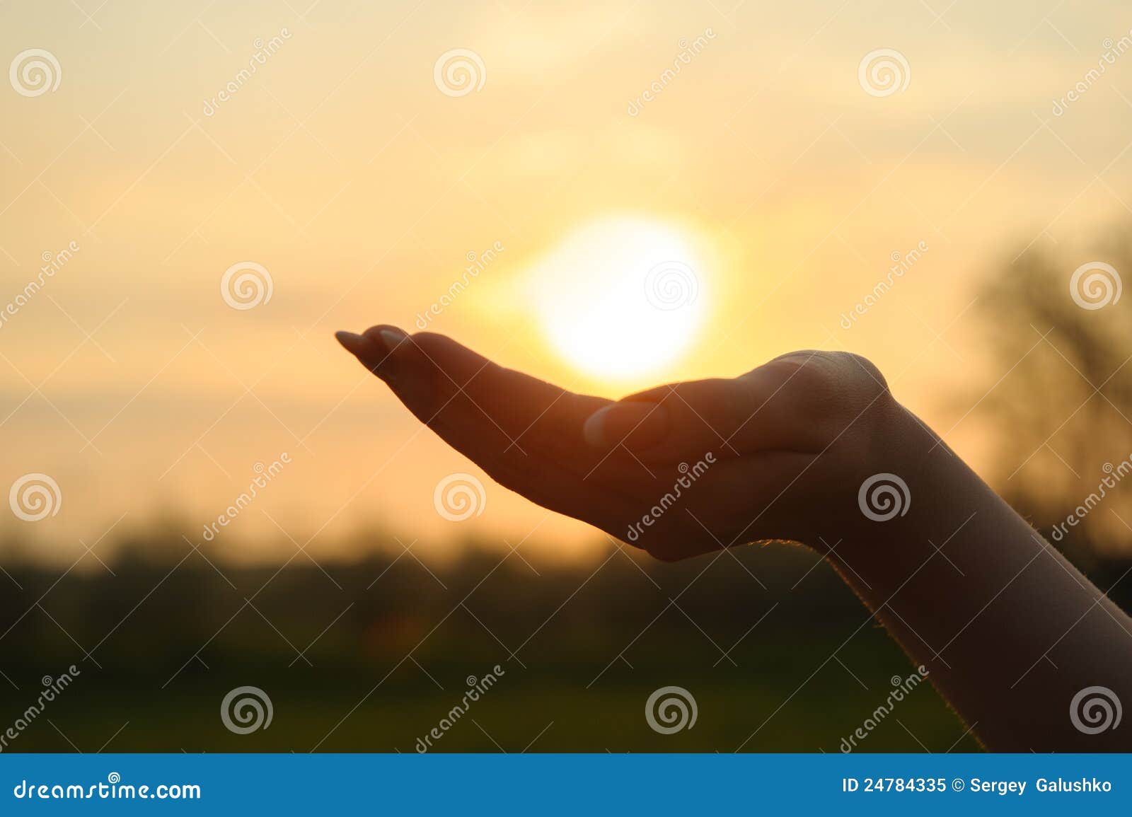 The sun in hand stock image. Image of meditating, glowing - 24784335