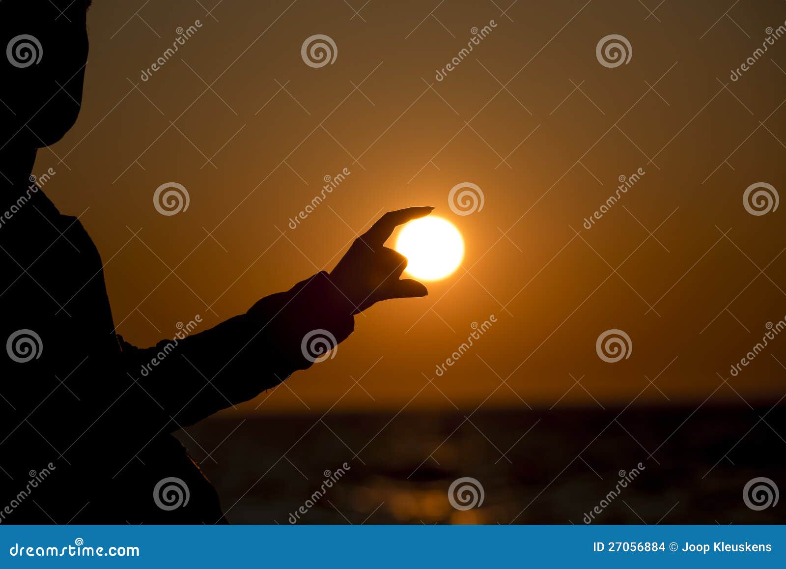 Sun in hands stock photo. Image of orange, golden, silhouette - 27056884