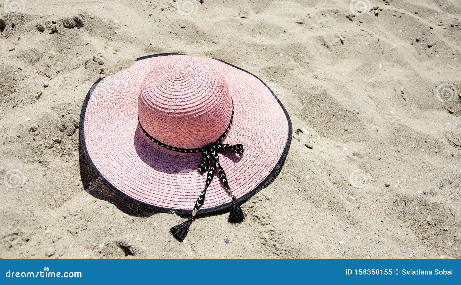 Sun Hat at the Beach. Pink Sun Hat on the Sand at the Beach Stock Image ...