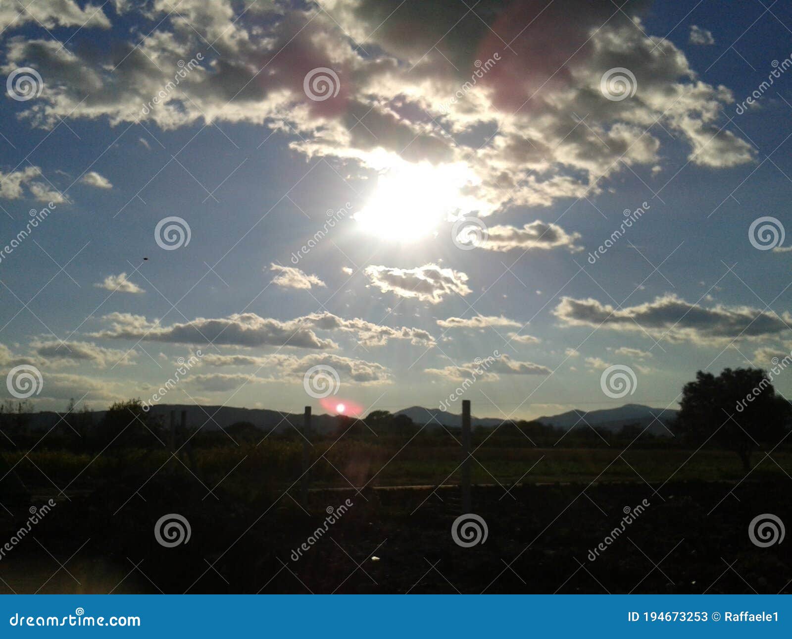 Sun hidden by the clouds stock image. Image of cloudy - 194673253