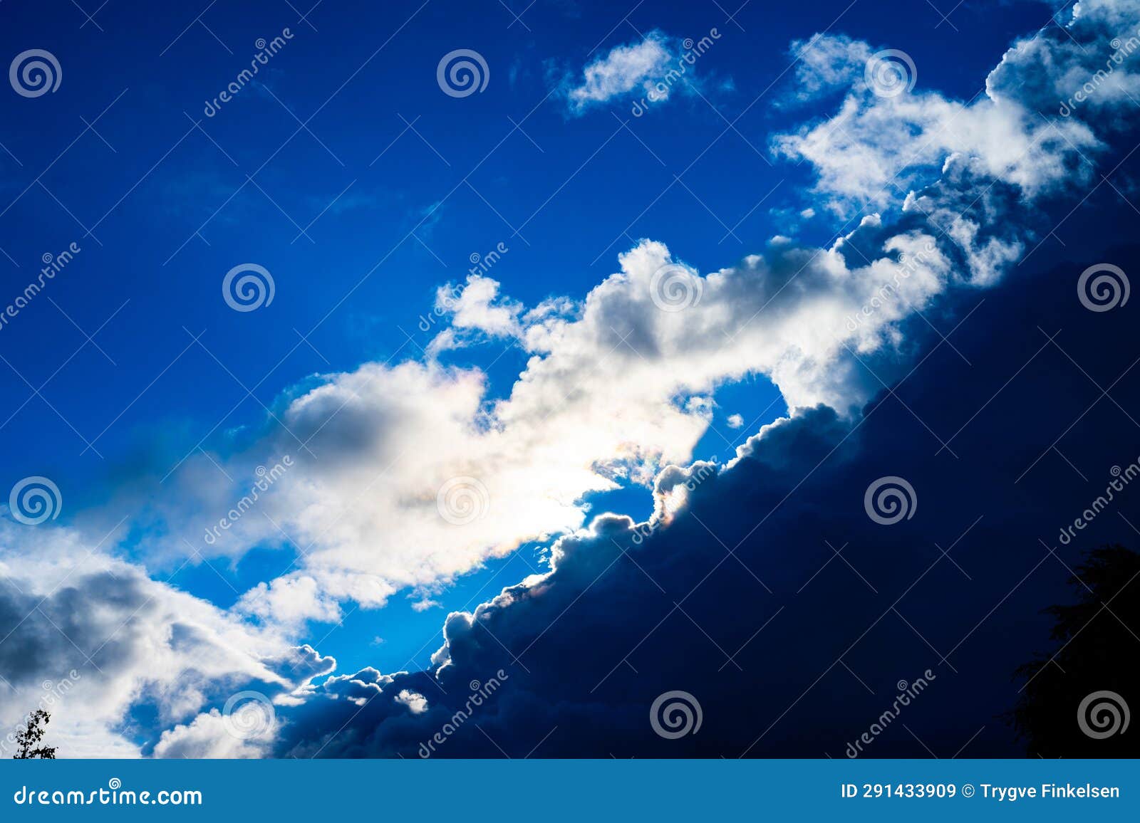 Sun Hiding Behind Dramatic Clouds.. Stock Image - Image of light ...