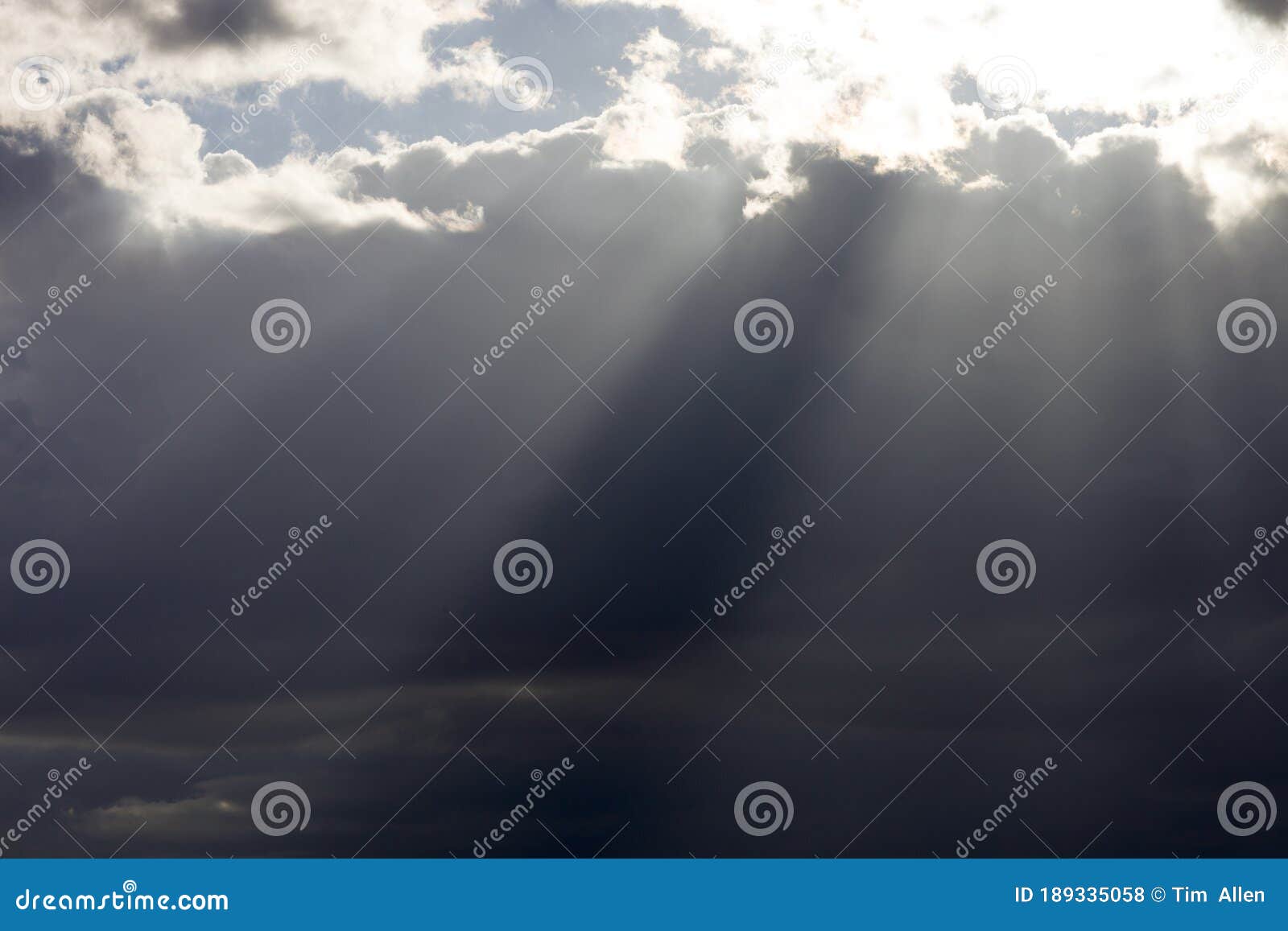 Sun Light Beaming through Gap in the Clouds Stock Photo - Image of ...