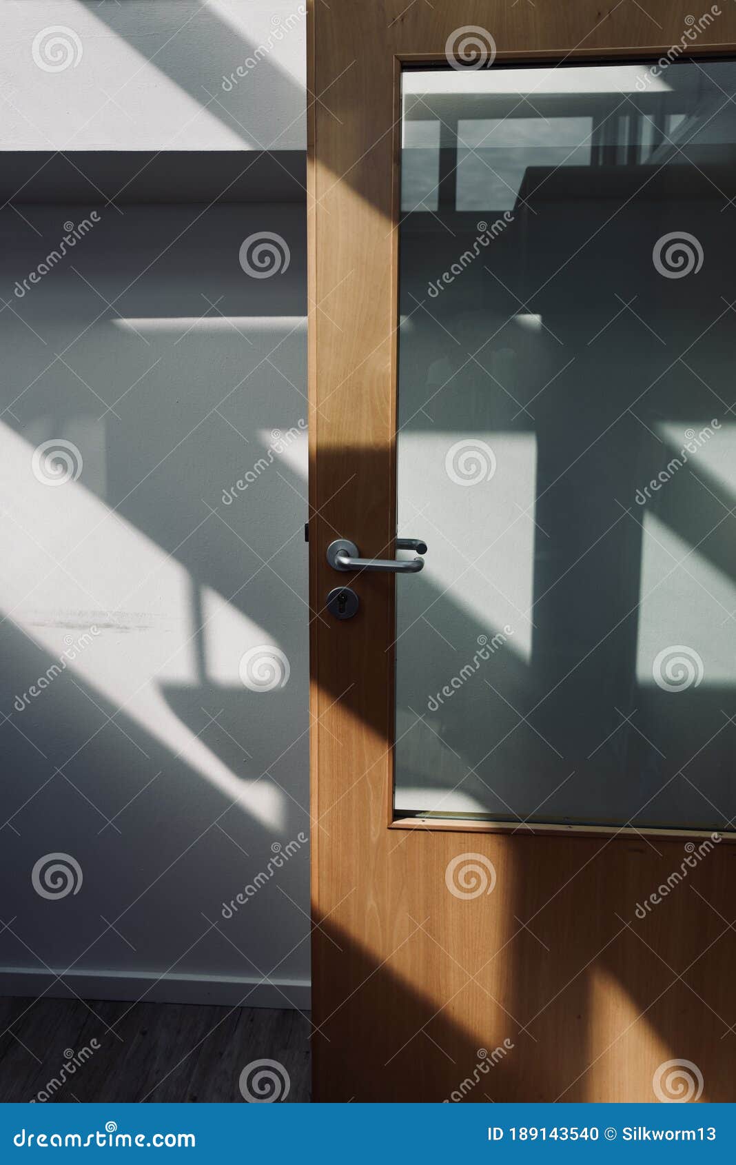 Light and Shadow on a Wall and Door in an Office Building Stock Photo ...