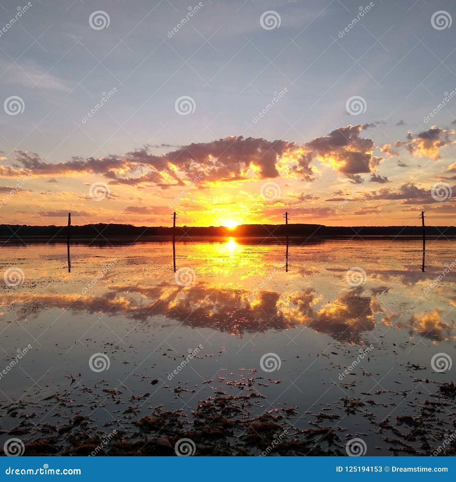 Sunset stock image. Image of mirror, sunset, cloud, looks - 125194153