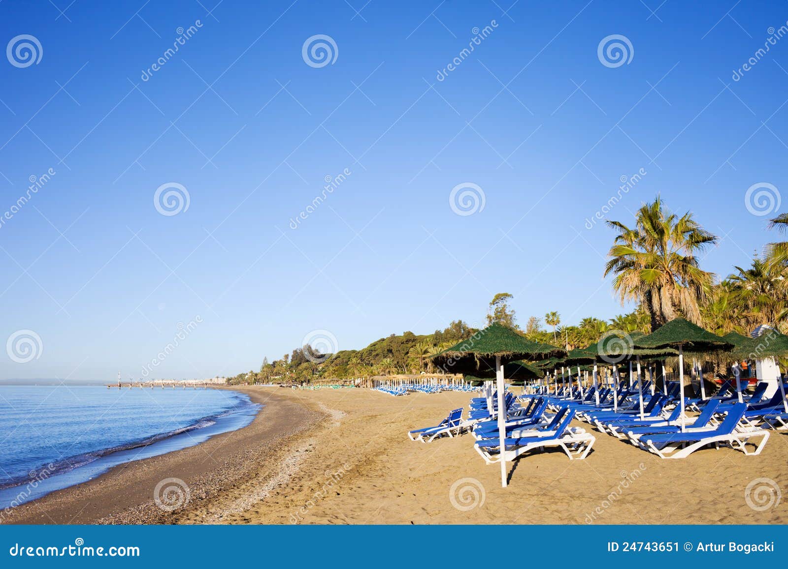 Sun Loungers on a Sandy Beach in Marbella Stock Image - Image of ...