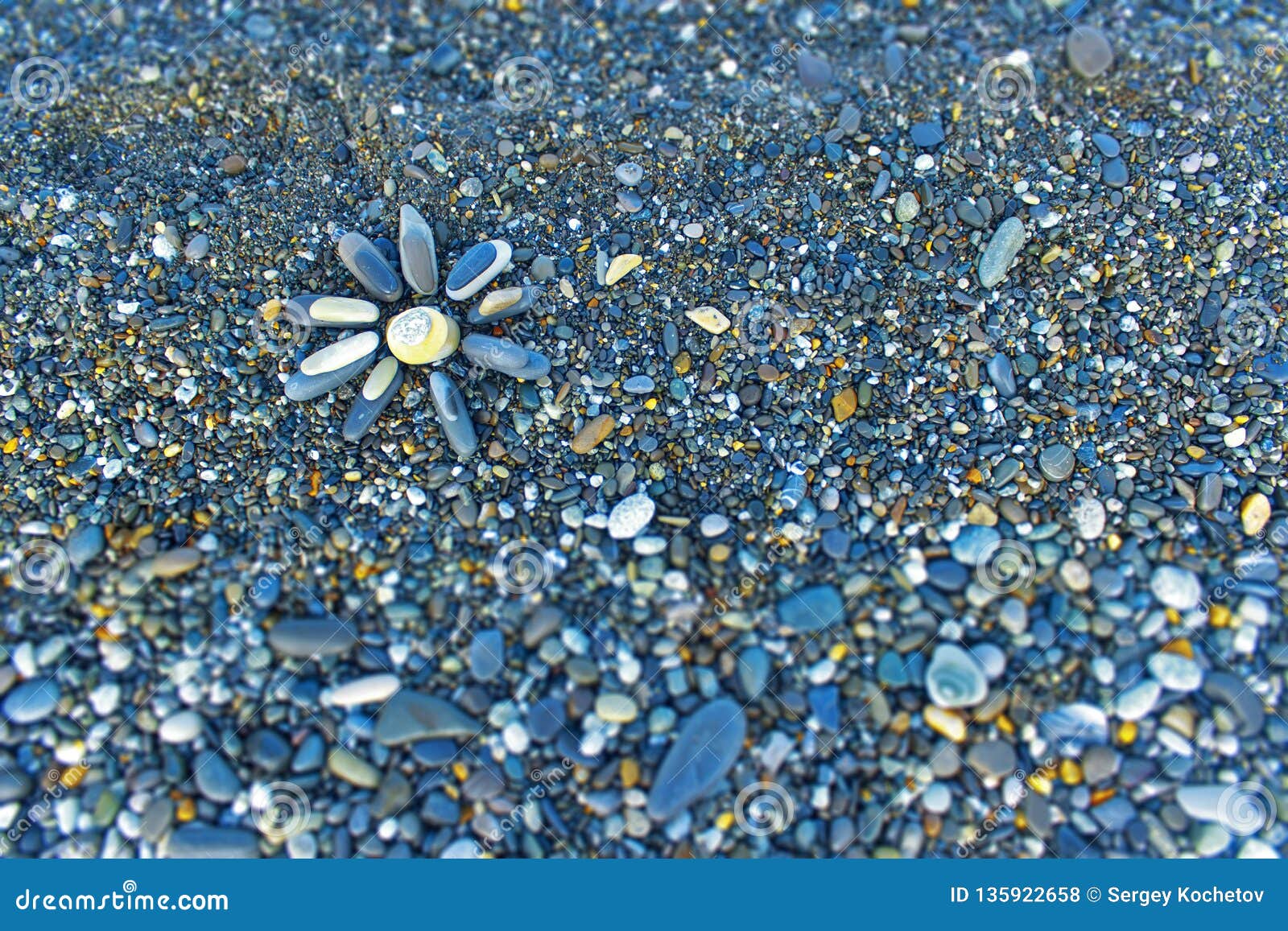Sun Made of Stones on the Beach. Top View Stock Photo - Image of water ...