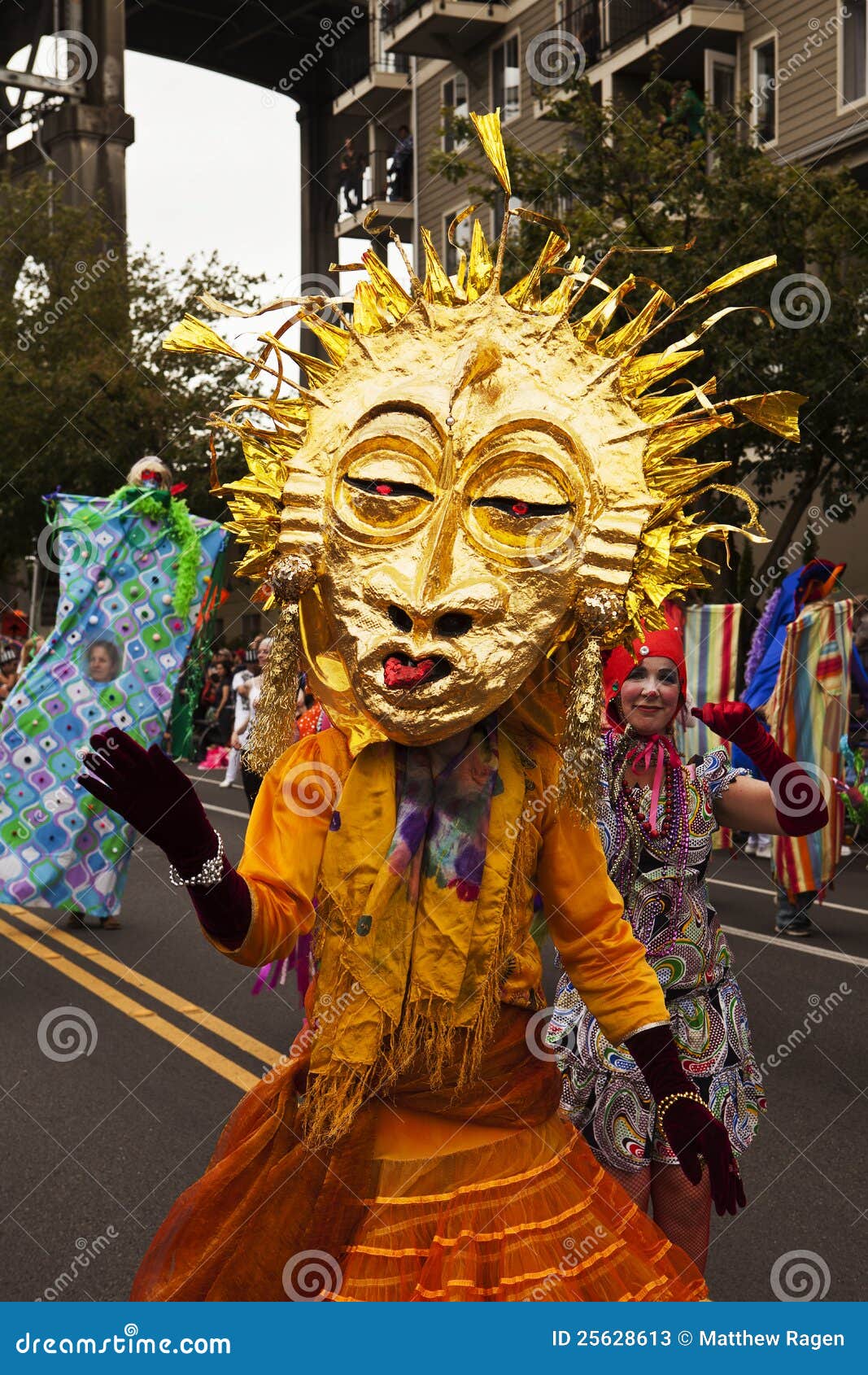 Sun Mask in the Parade editorial stock photo. Image of colourful - 25628613