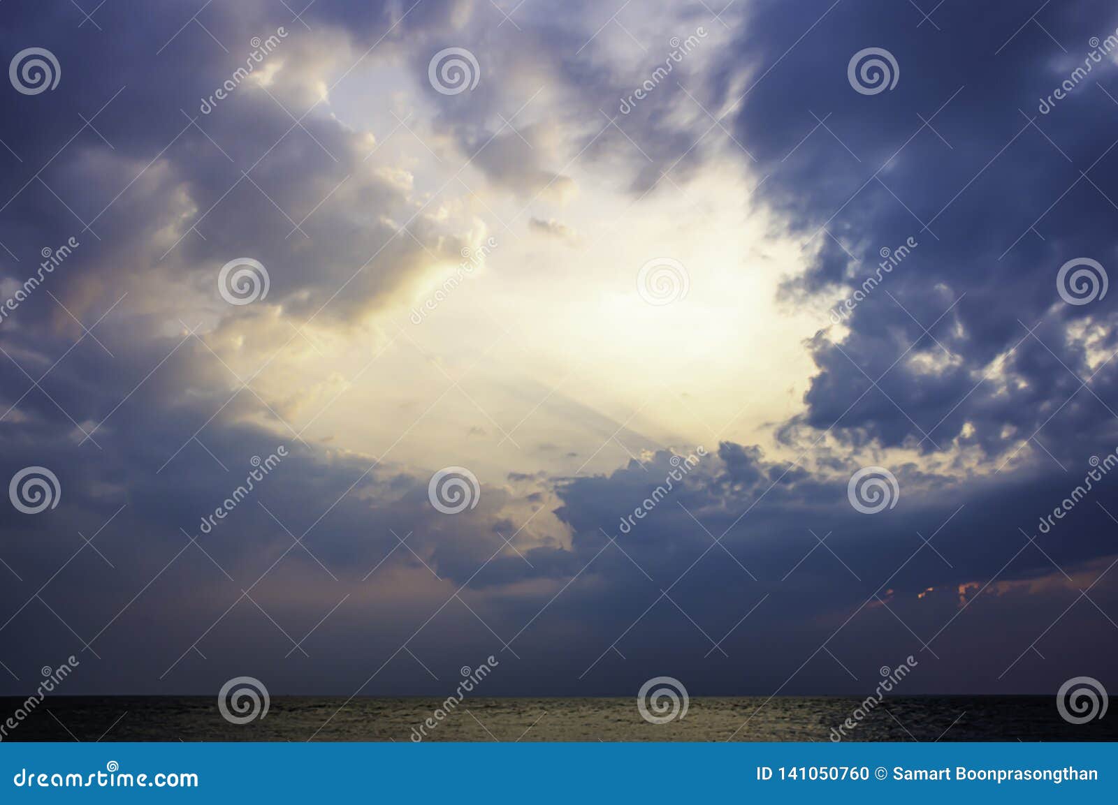 The Sun in the Morning that Reflect the Clouds and the Sea Stock Photo ...