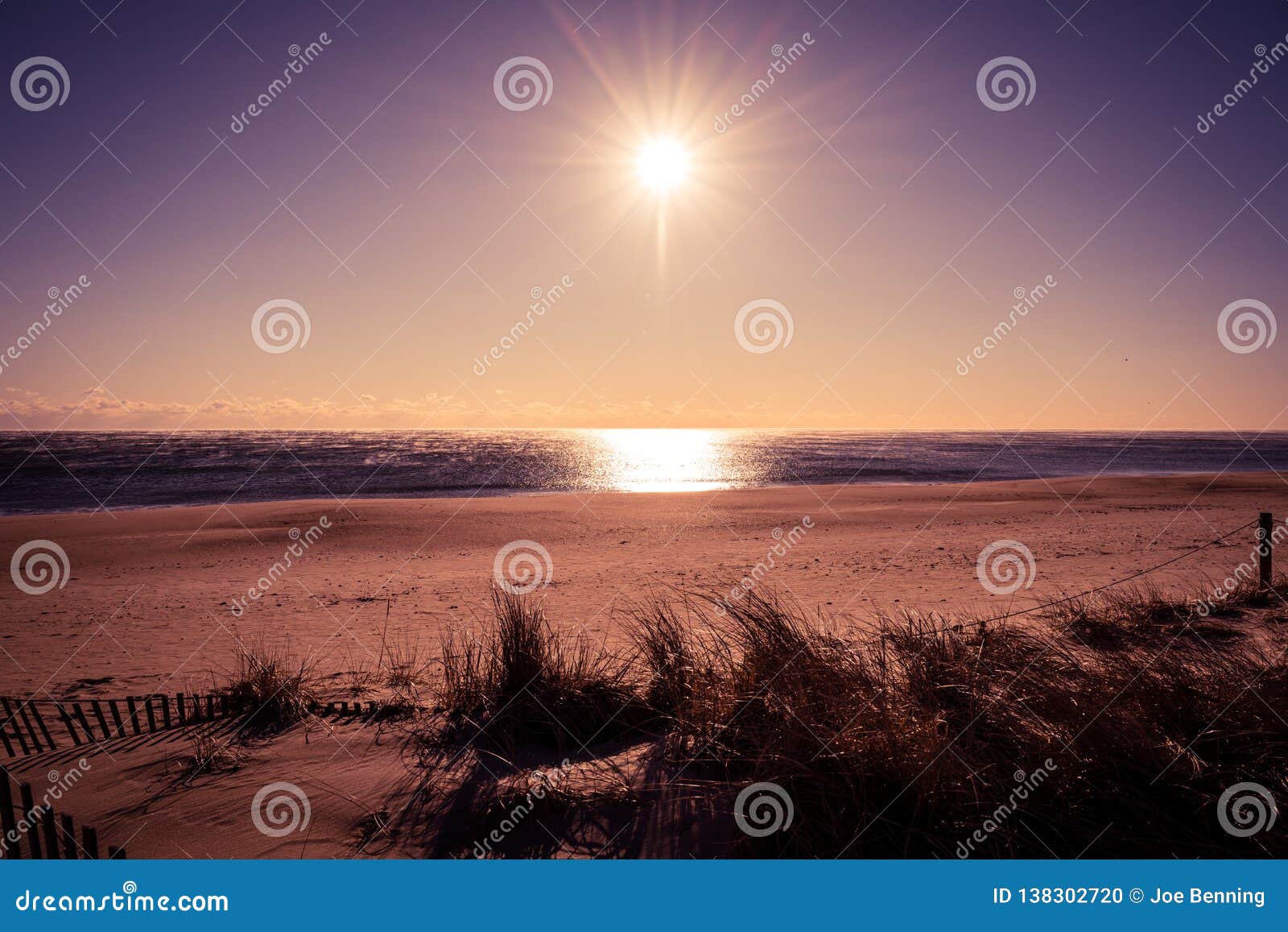 Sun Over a Bitter Cold Beach Stock Photo - Image of beach, outdoors ... Sun Over a Bitter Cold Beach Stock Photo - Image of beach, outdoors ...
