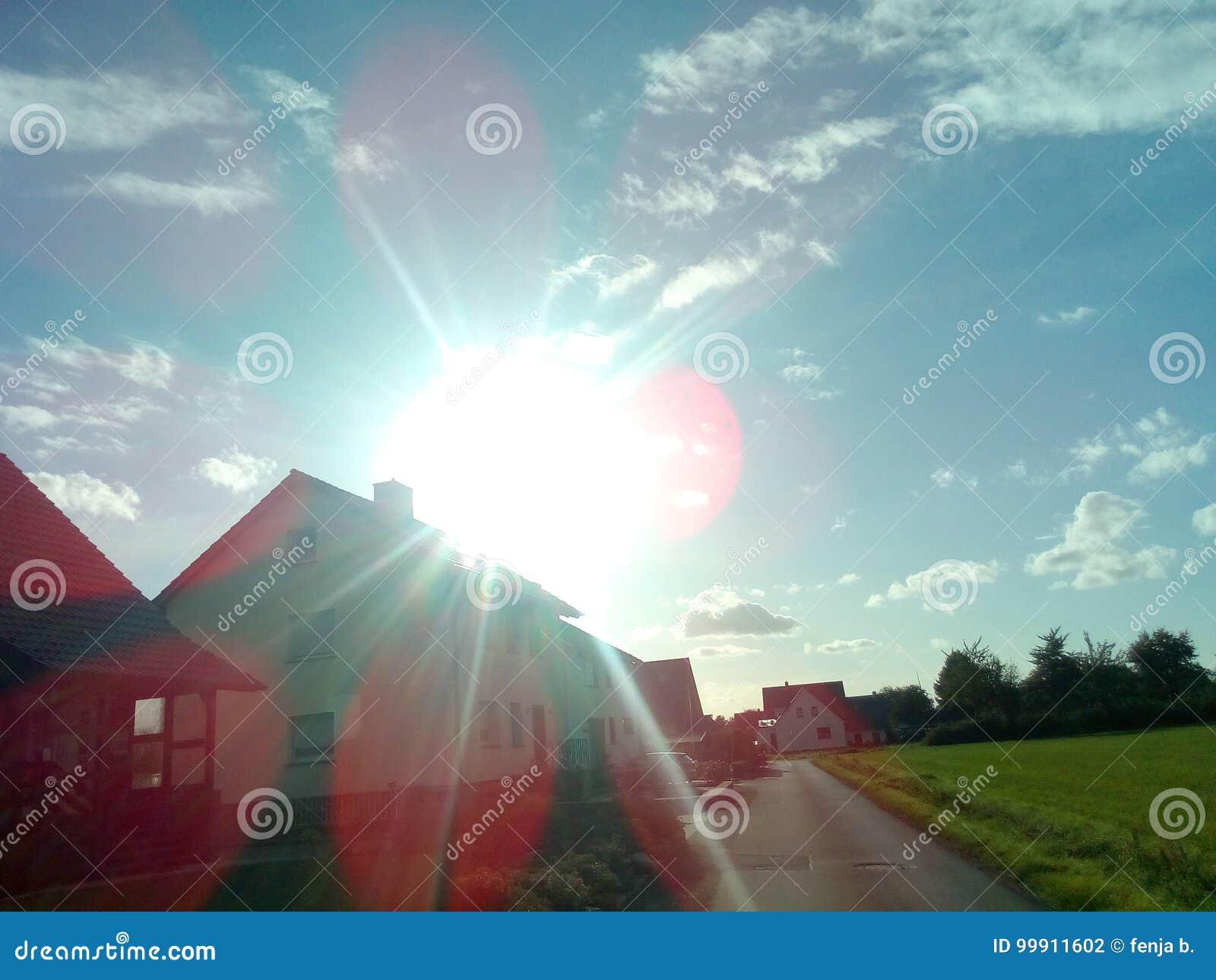 Sun over a house stock photo. Image of house, grase, left - 99911602