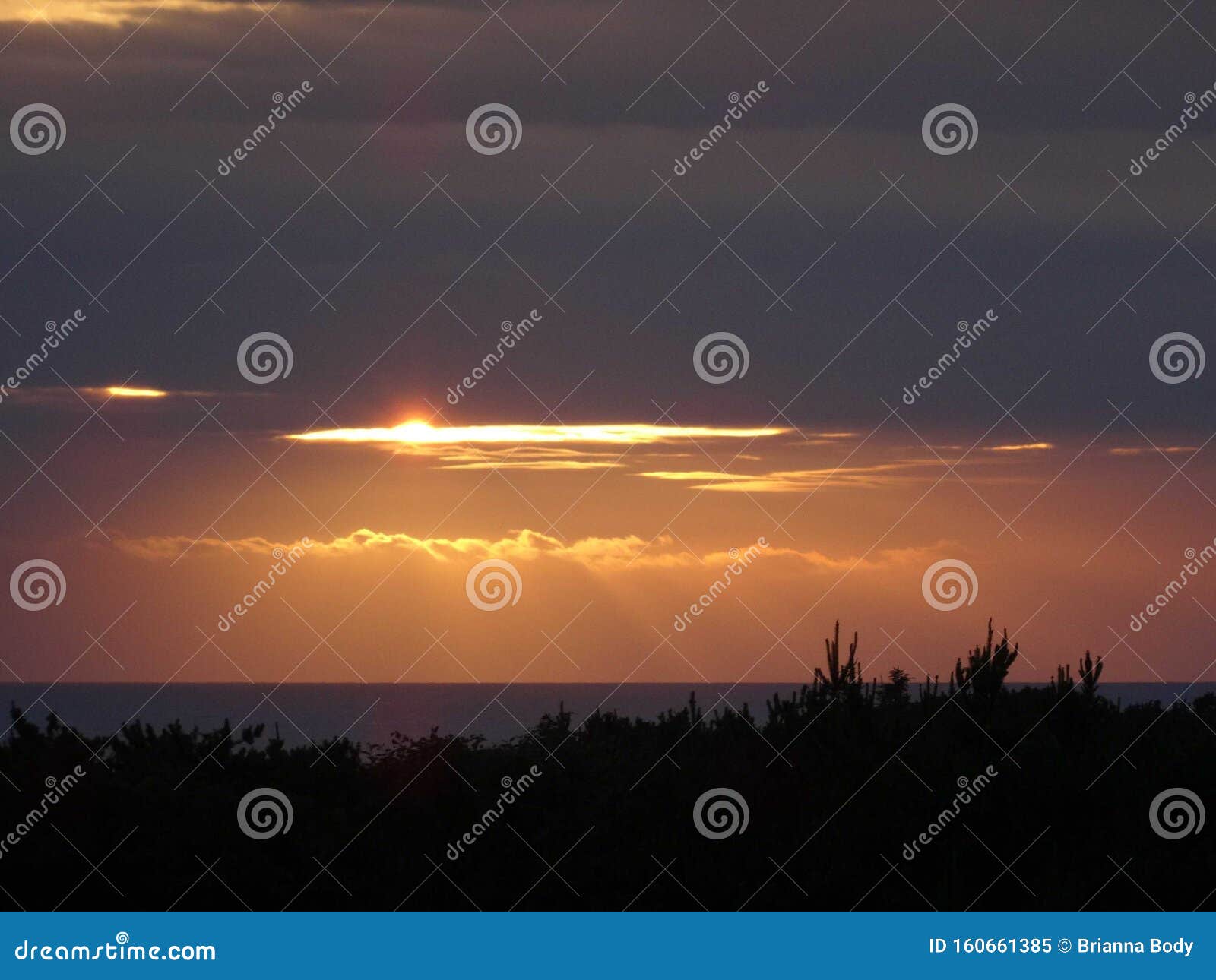 Sun peaking through stock image. Image of sunset, peaking - 160661385