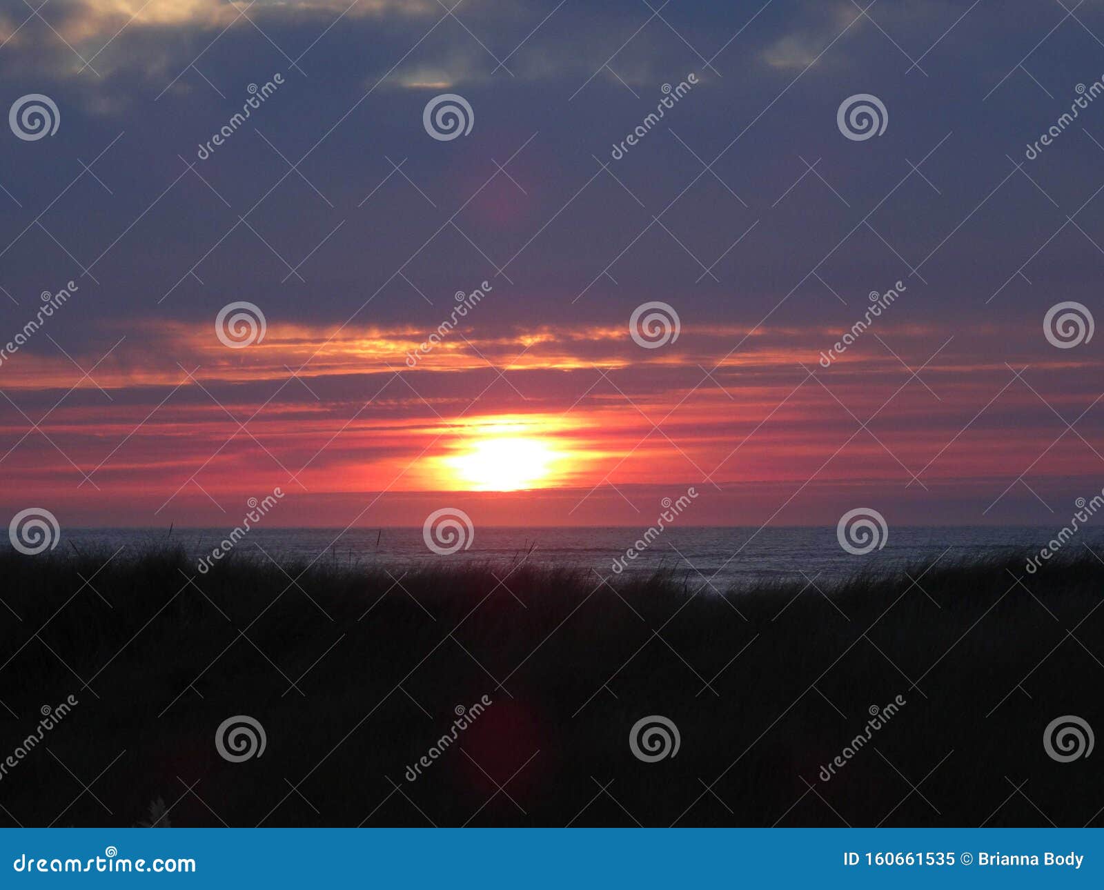 Sun peaking through stock image. Image of sunset, peaking - 160661535