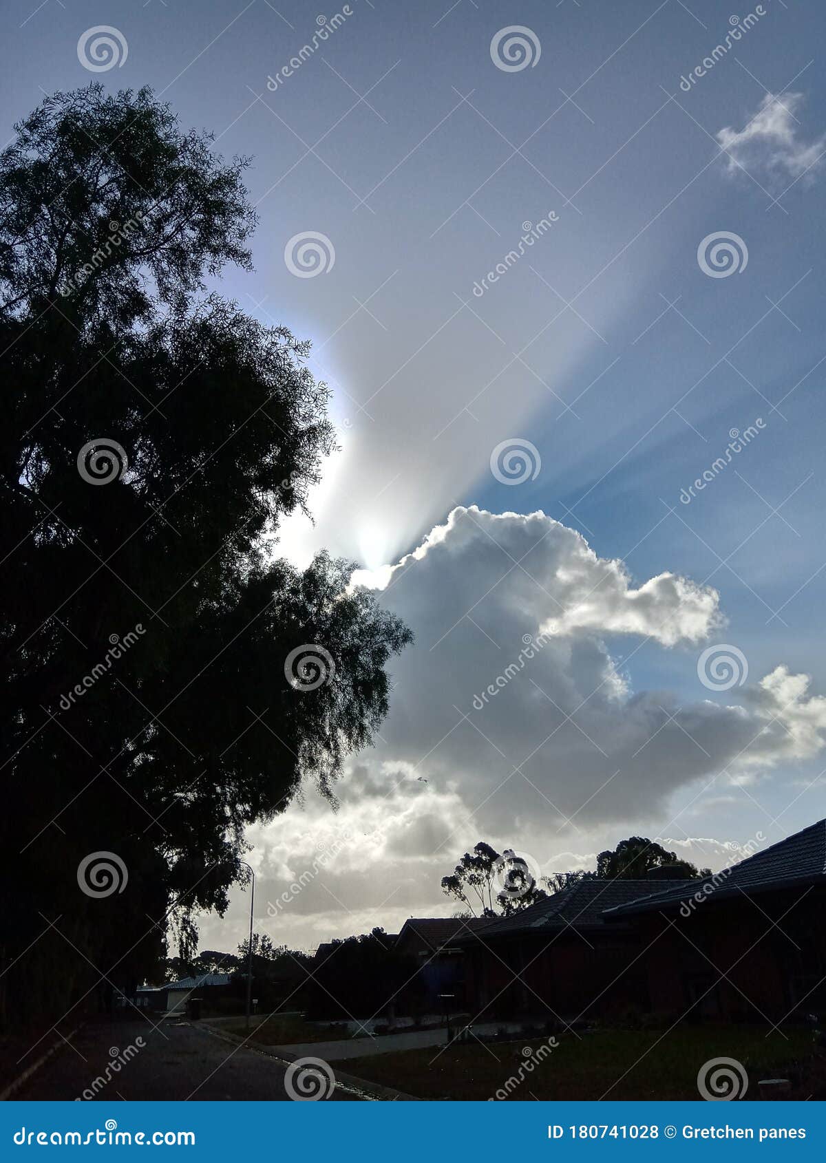 Sun Peeking Behind the Clouds Stock Photo - Image of sunset, nature ...