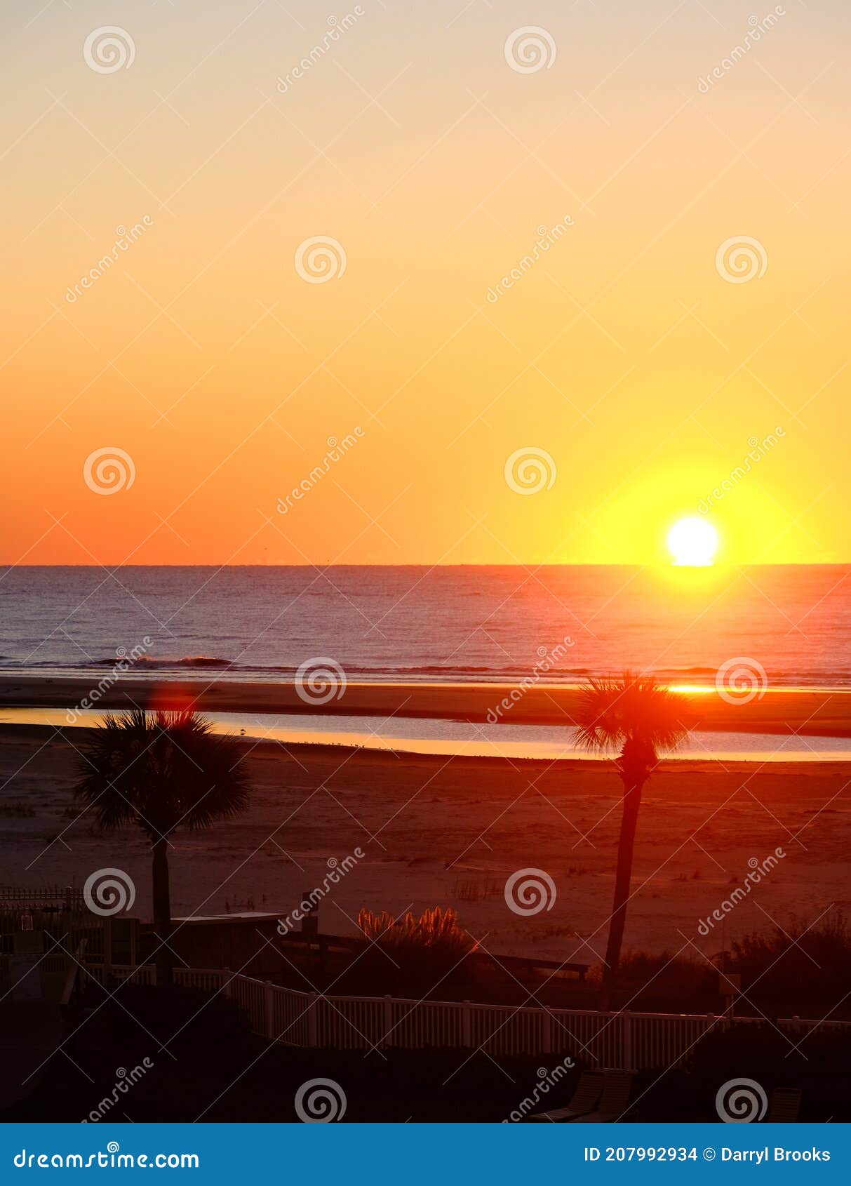 Sun Peeking Over the Horizon Stock Photo - Image of color, sunrise ...