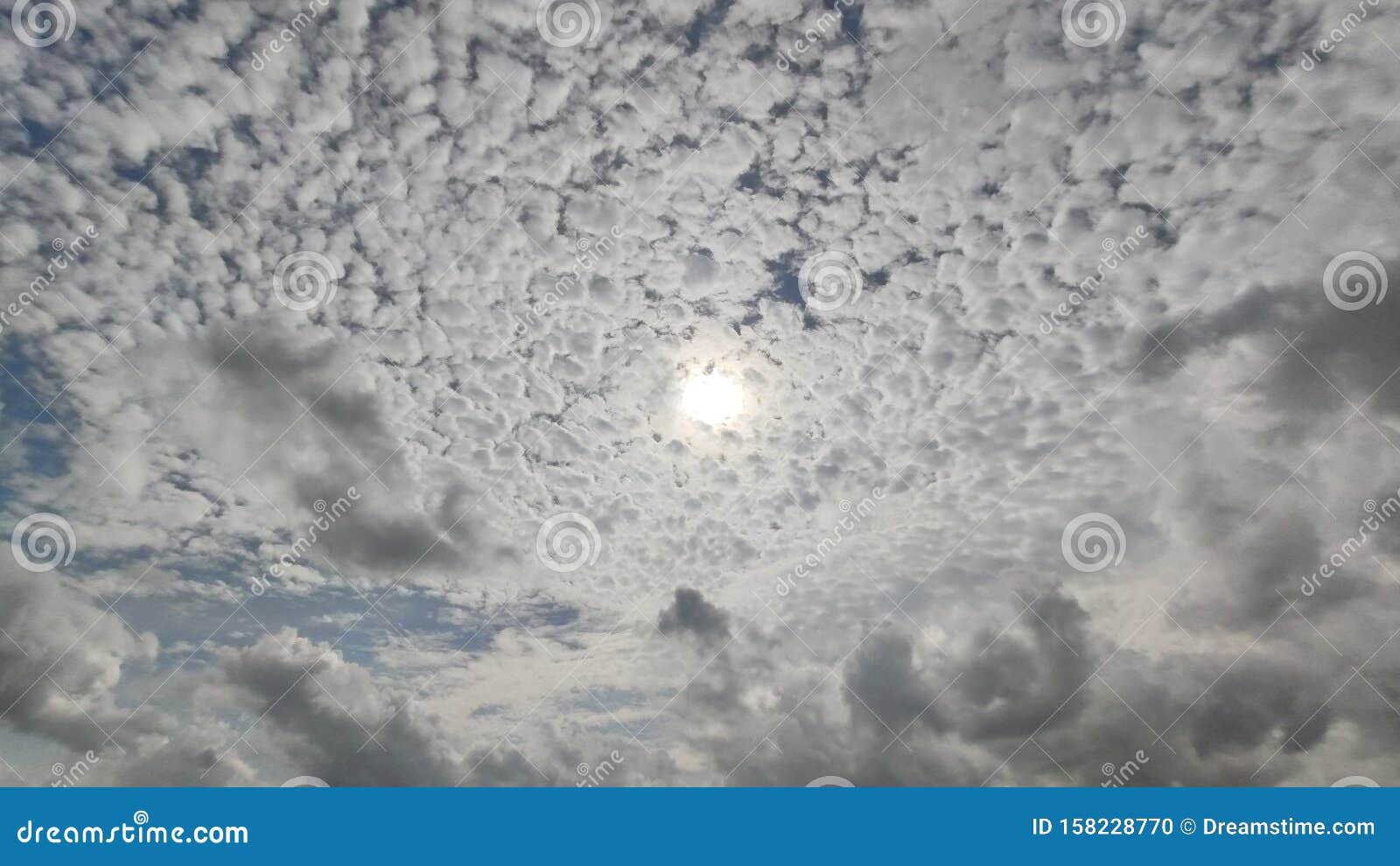 Sun Piercing through the Clouds on Hot Sunny Day Stock Photo - Image of ...