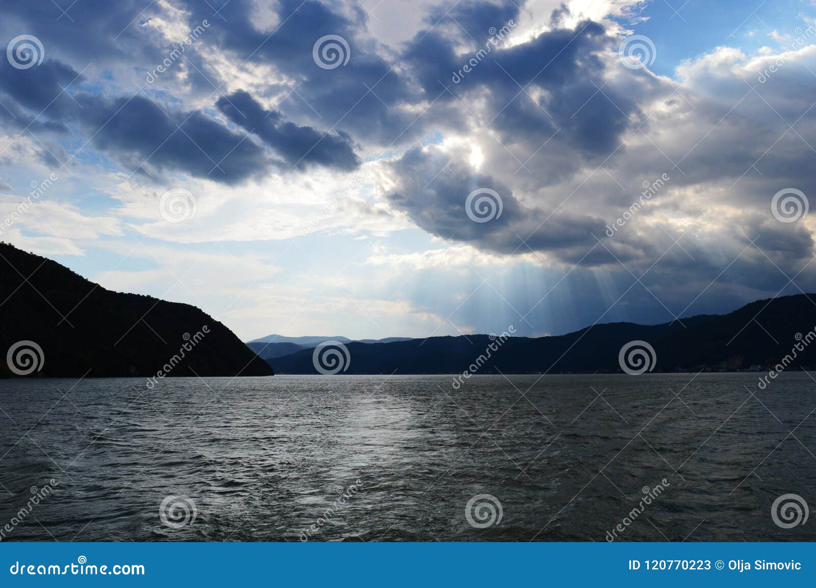 The Sun Radiates through the Clouds Stock Image - Image of nature, blue ...