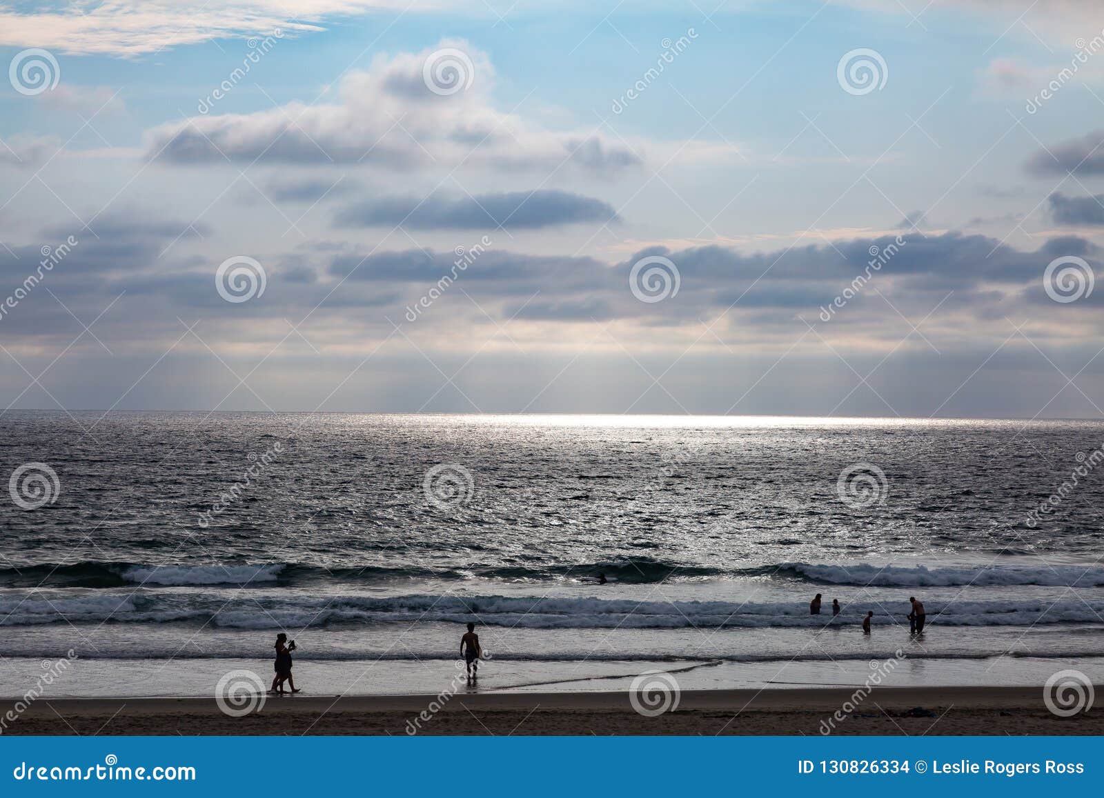 Sun Radiates through a Cloud and Creates Ocean Spotlight Stock Photo ...