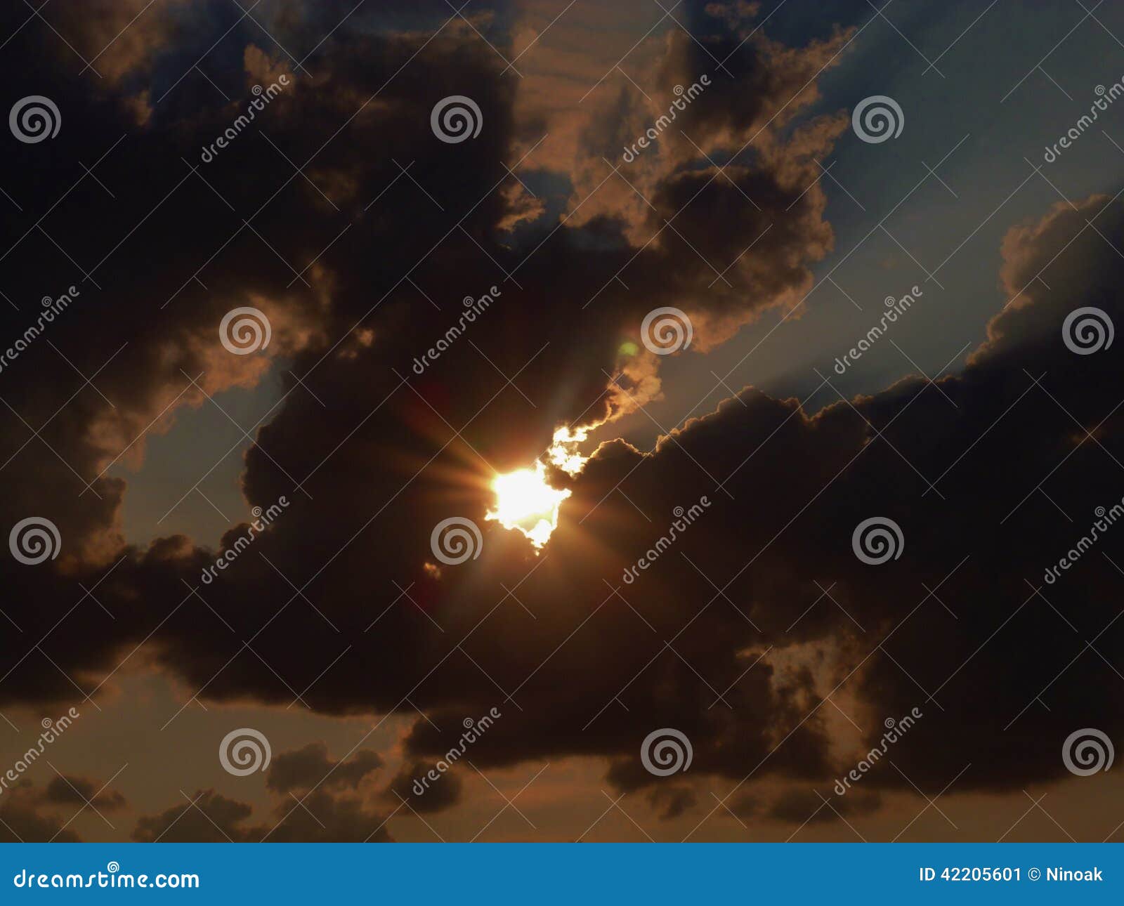 Sun Radiating through the Clouds Stock Image - Image of radial, colours ...