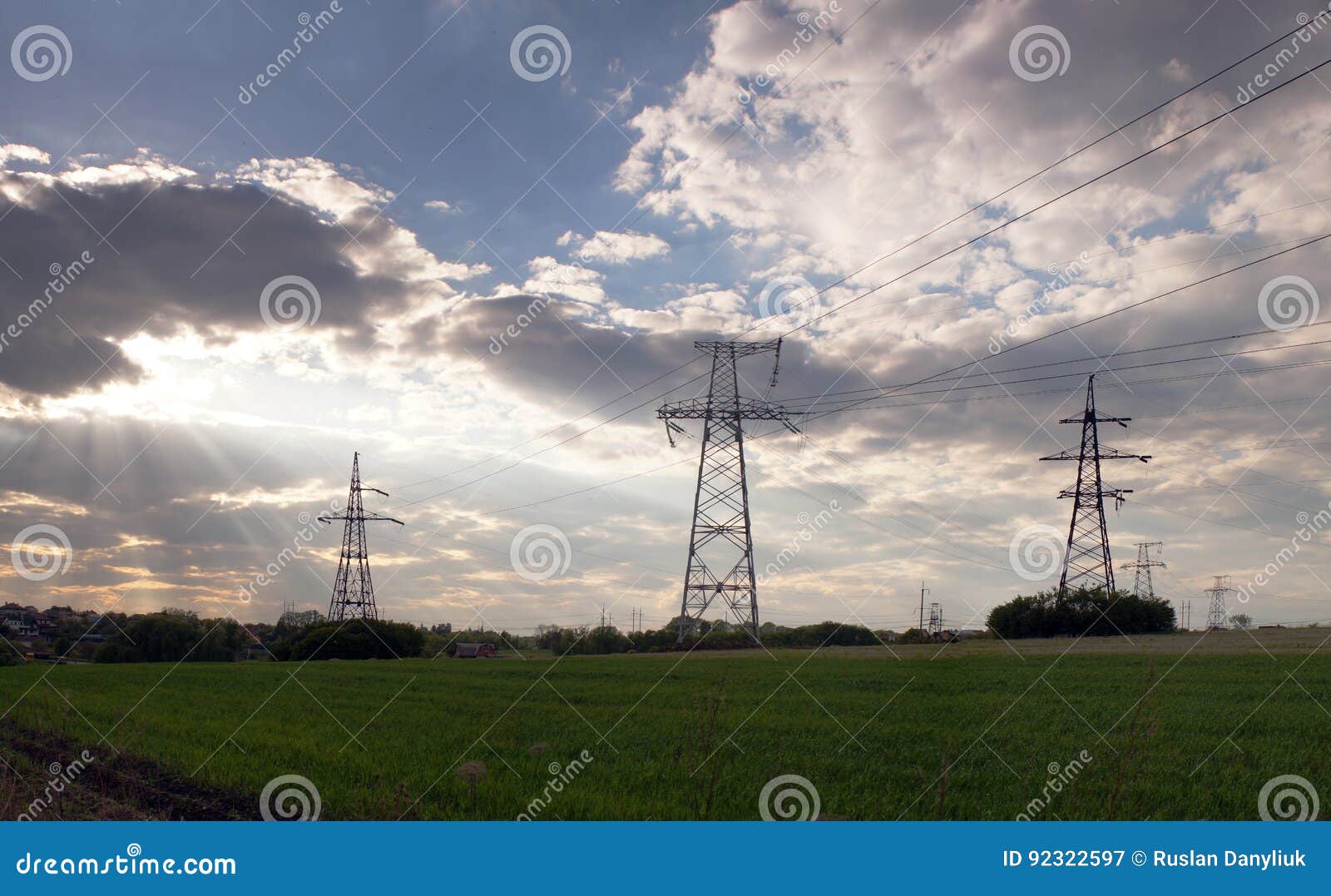 Sun Rays Above Electrical Distribution Powerlines. Rays of the S Stock ...