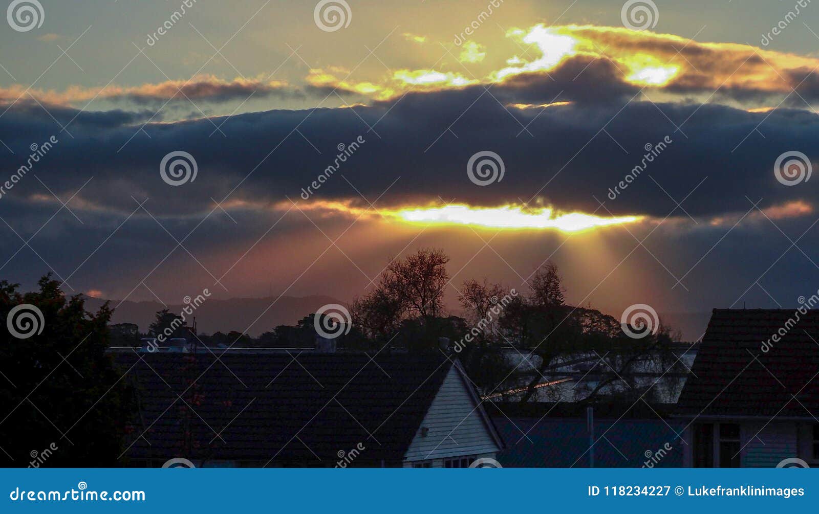 Sun Rays Beaming through a Dark Cloud Stock Image - Image of seasonal ...
