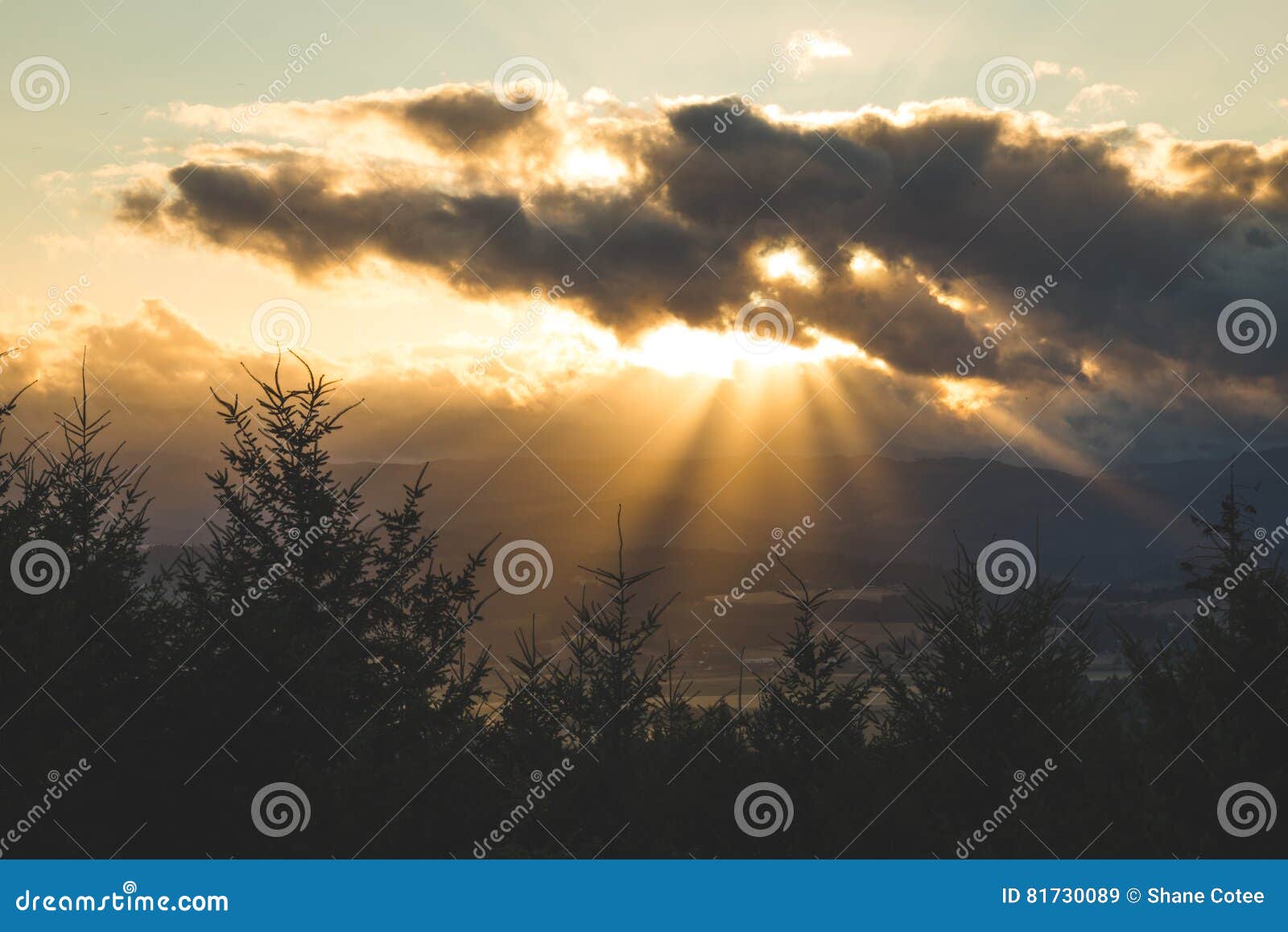 Sun Rays from Behind a Cloud Stock Image - Image of valley, sunrise ...