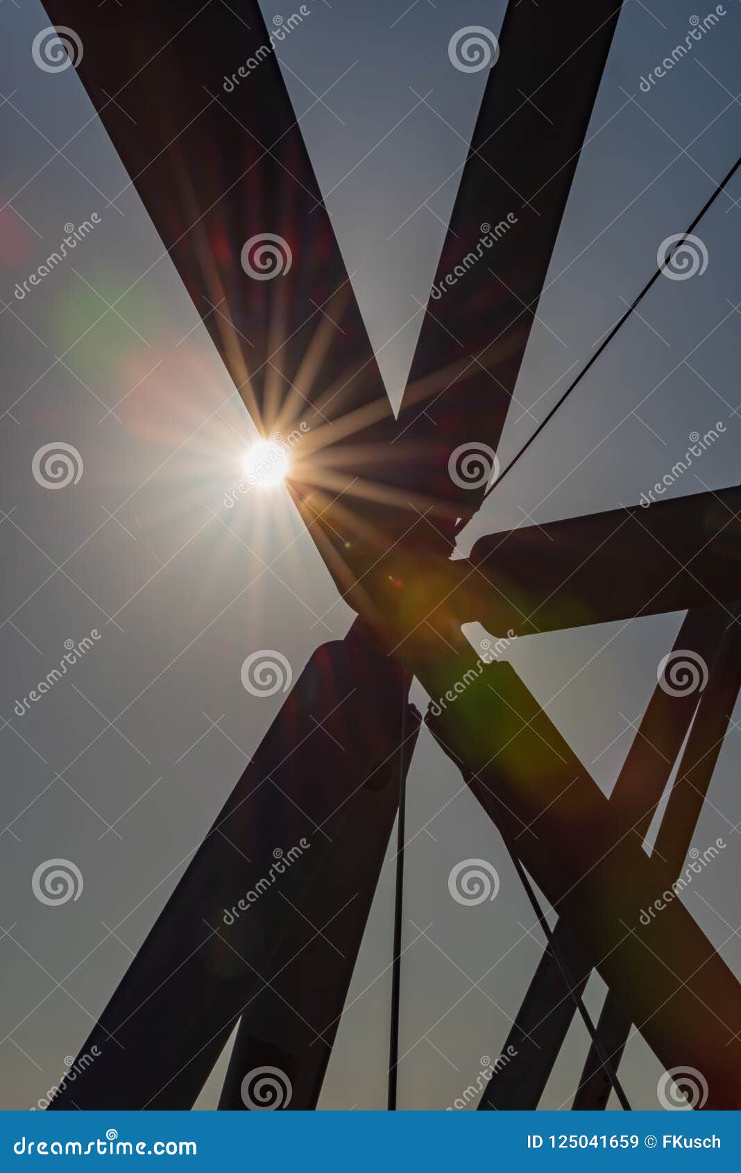 Sun Rays Behind a Dark Steel Construction Stock Image - Image of rays ...