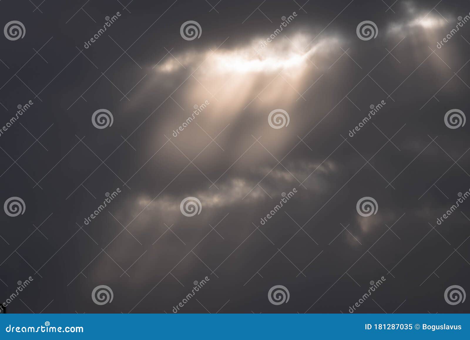 Sun Rays Breaking through the Layer of Dark Clouds. Stock Image - Image ...