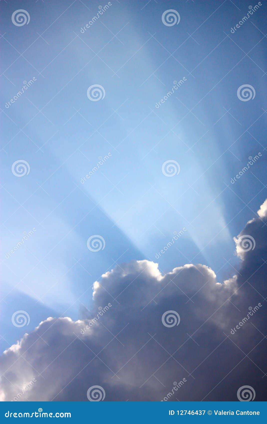 Sun rays through clouds stock image. Image of nature - 12746437