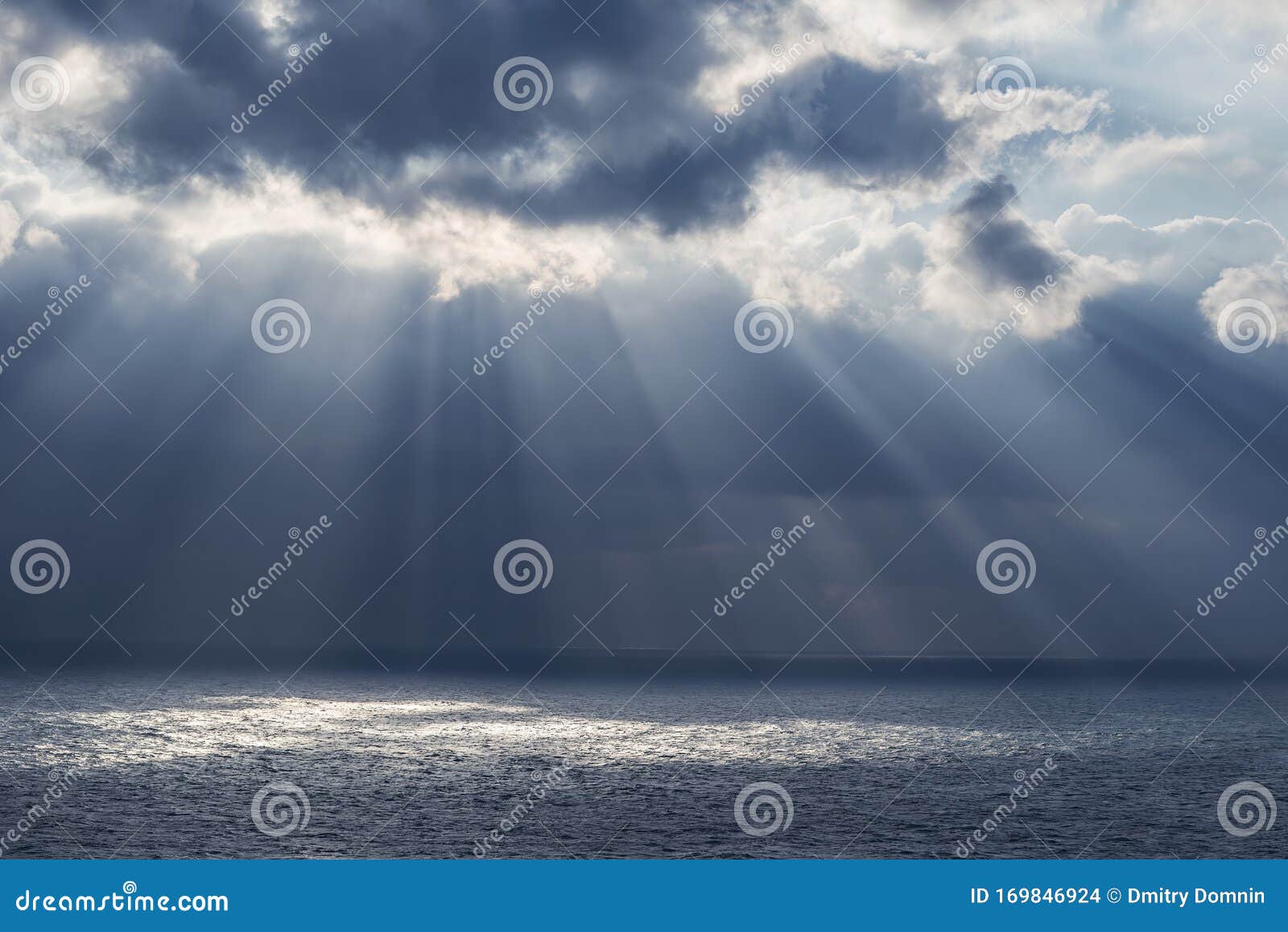 Sun Rays through the Clouds Over the Sea Stock Photo - Image of ...