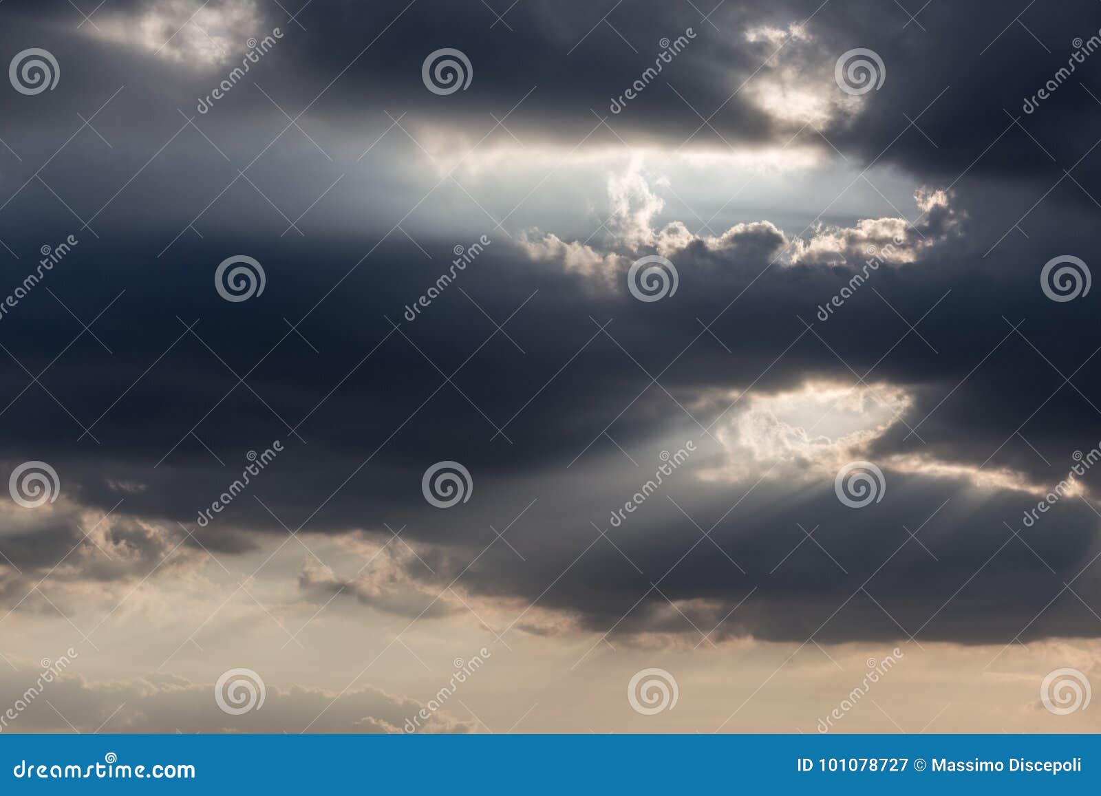 Sun Rays Coming Out through Some Dark Clouds Stock Image - Image of ...