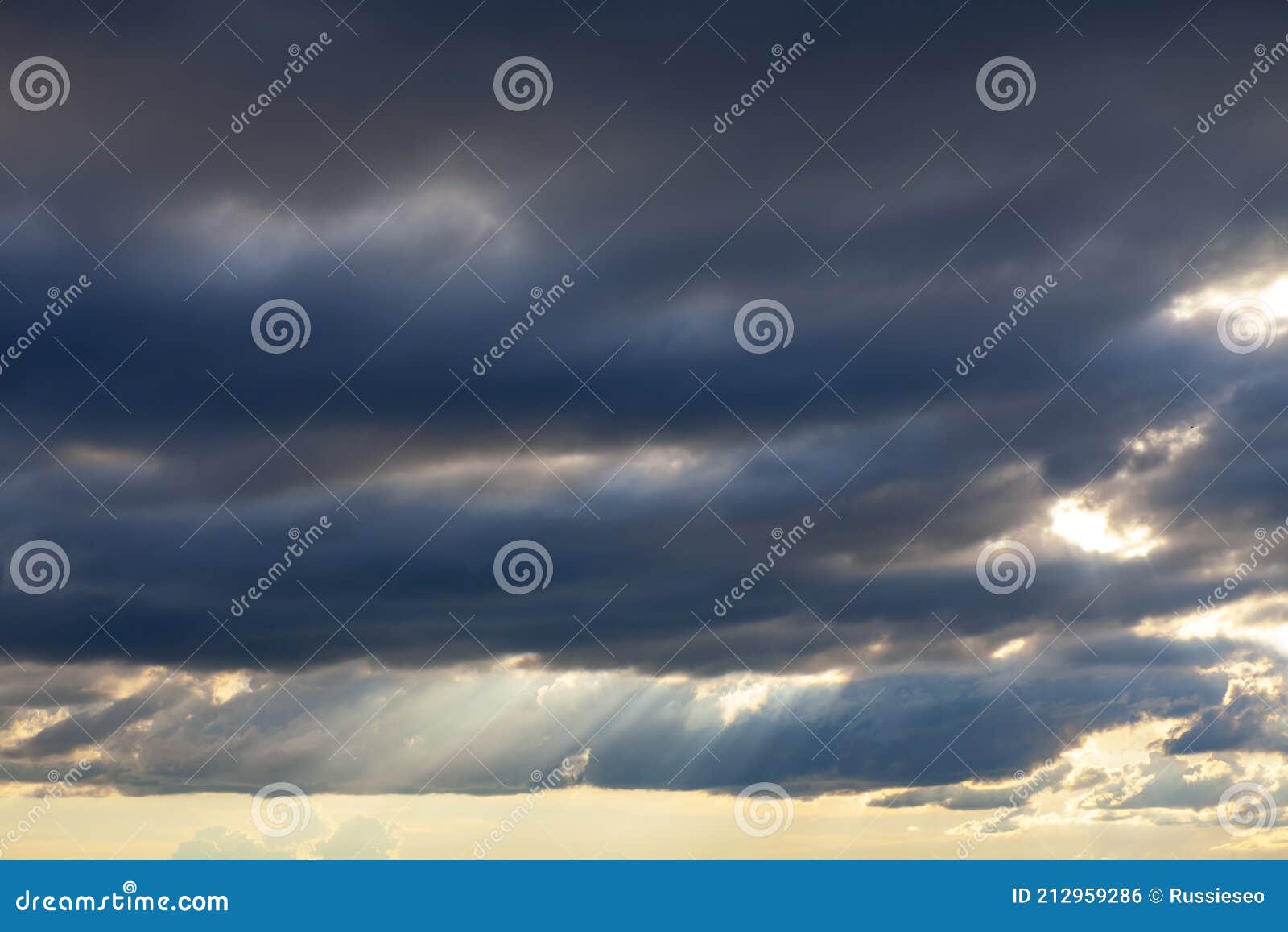 Sun Rays in Dark Clouds stock photo. Image of inferno - 212959286