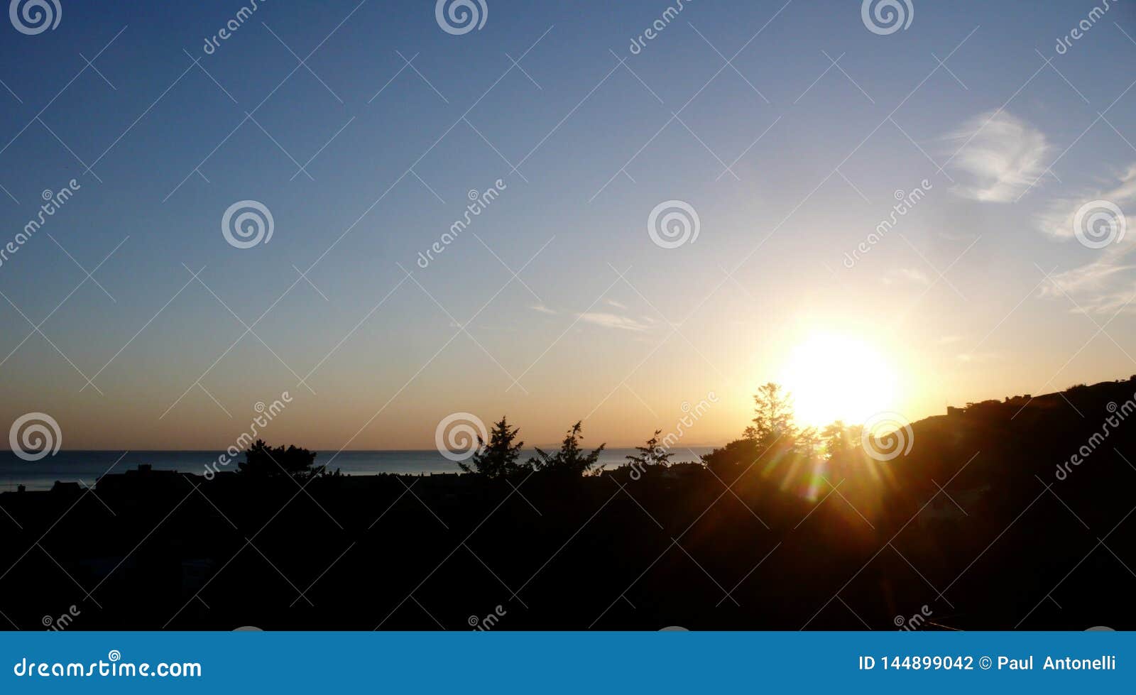 Sunset Over the Hill Version B Stock Photo - Image of flare, shadowed ...