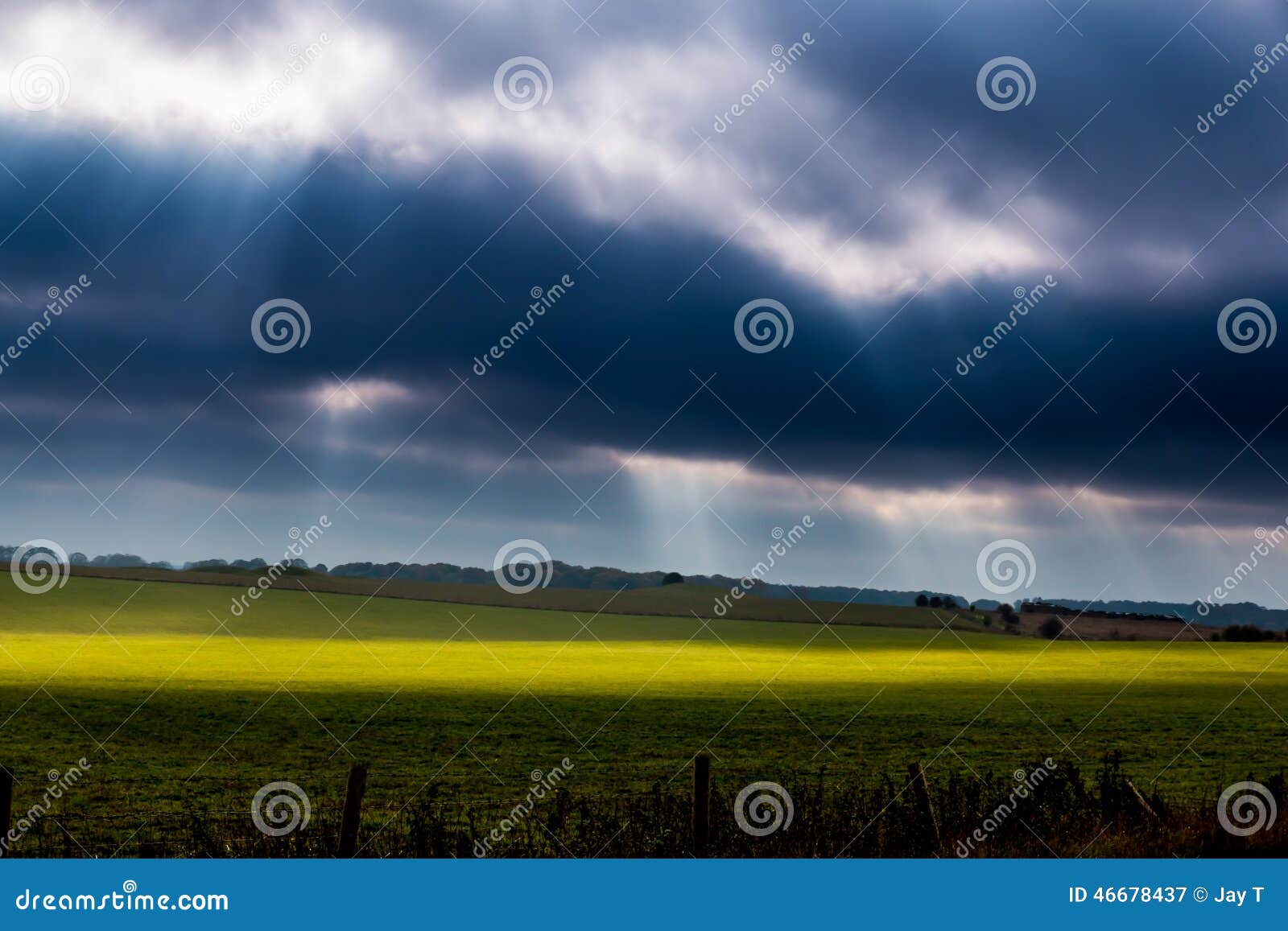 Sun rays on field stock image. Image of clouds, blue - 46678437