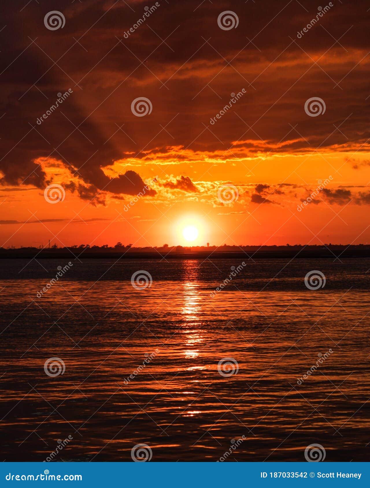 Sun Rays God Rays Shine through the Clouds As the Sun Sets on the ...