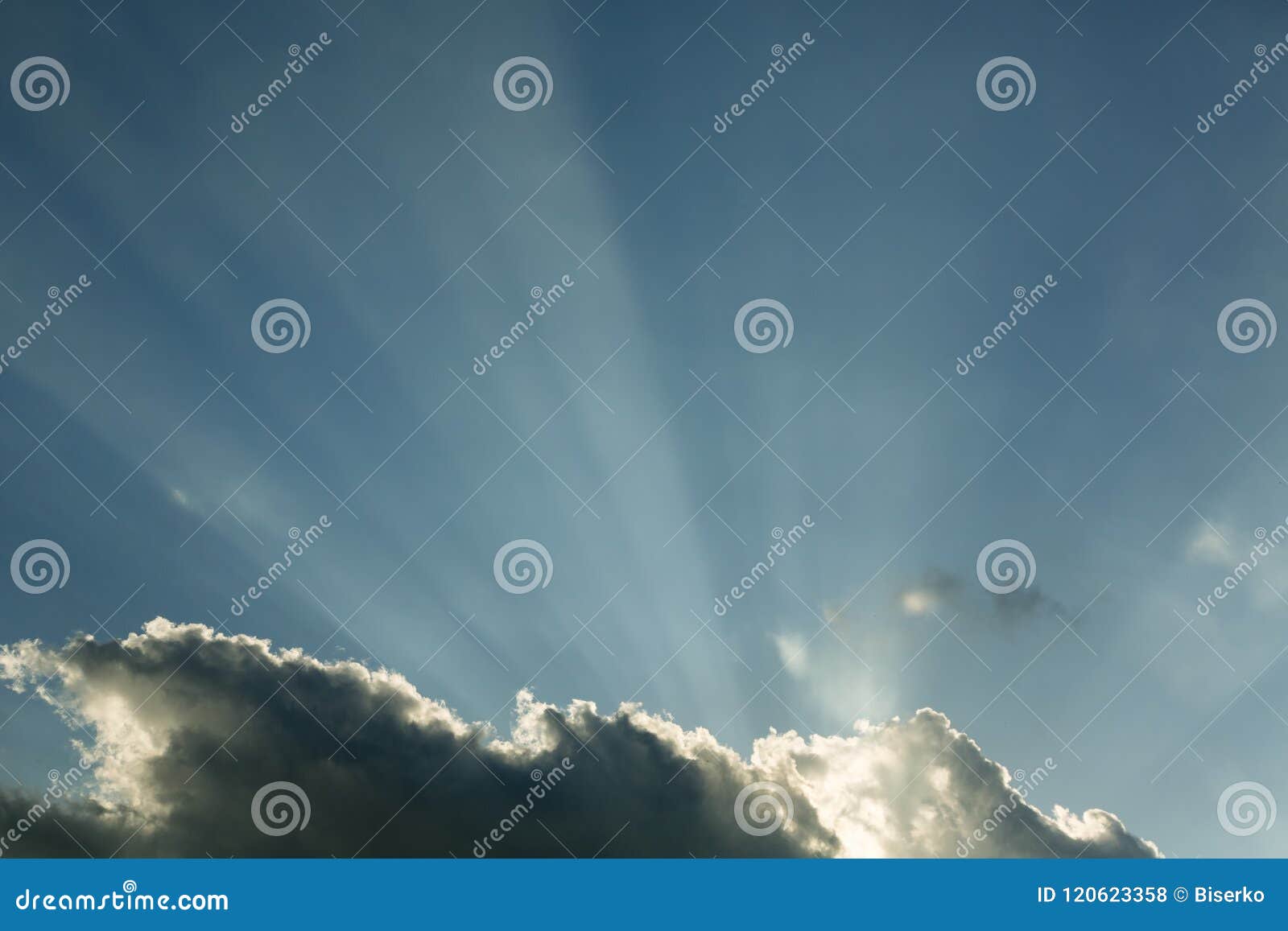 Sun rays behind the clouds stock photo. Image of cloud - 120623358