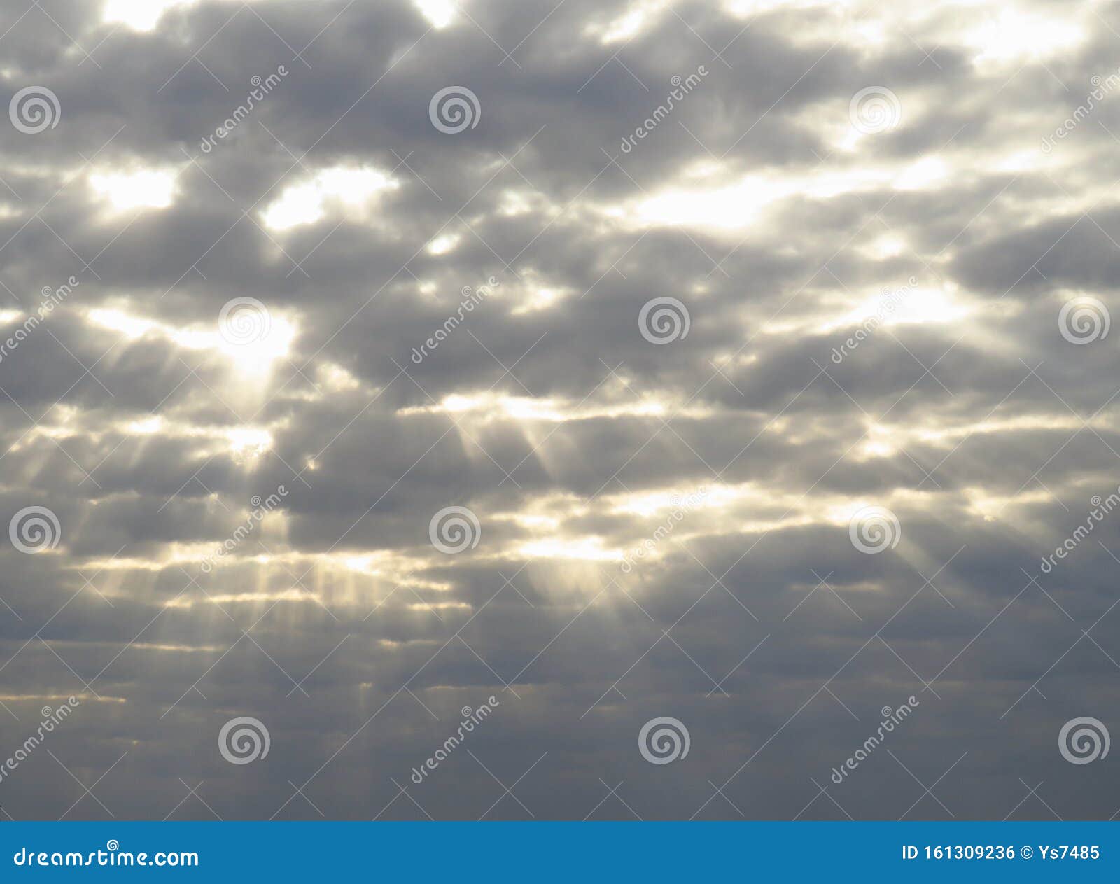 Sun Rays Light through the Storm Clouds Stock Photo - Image of ...