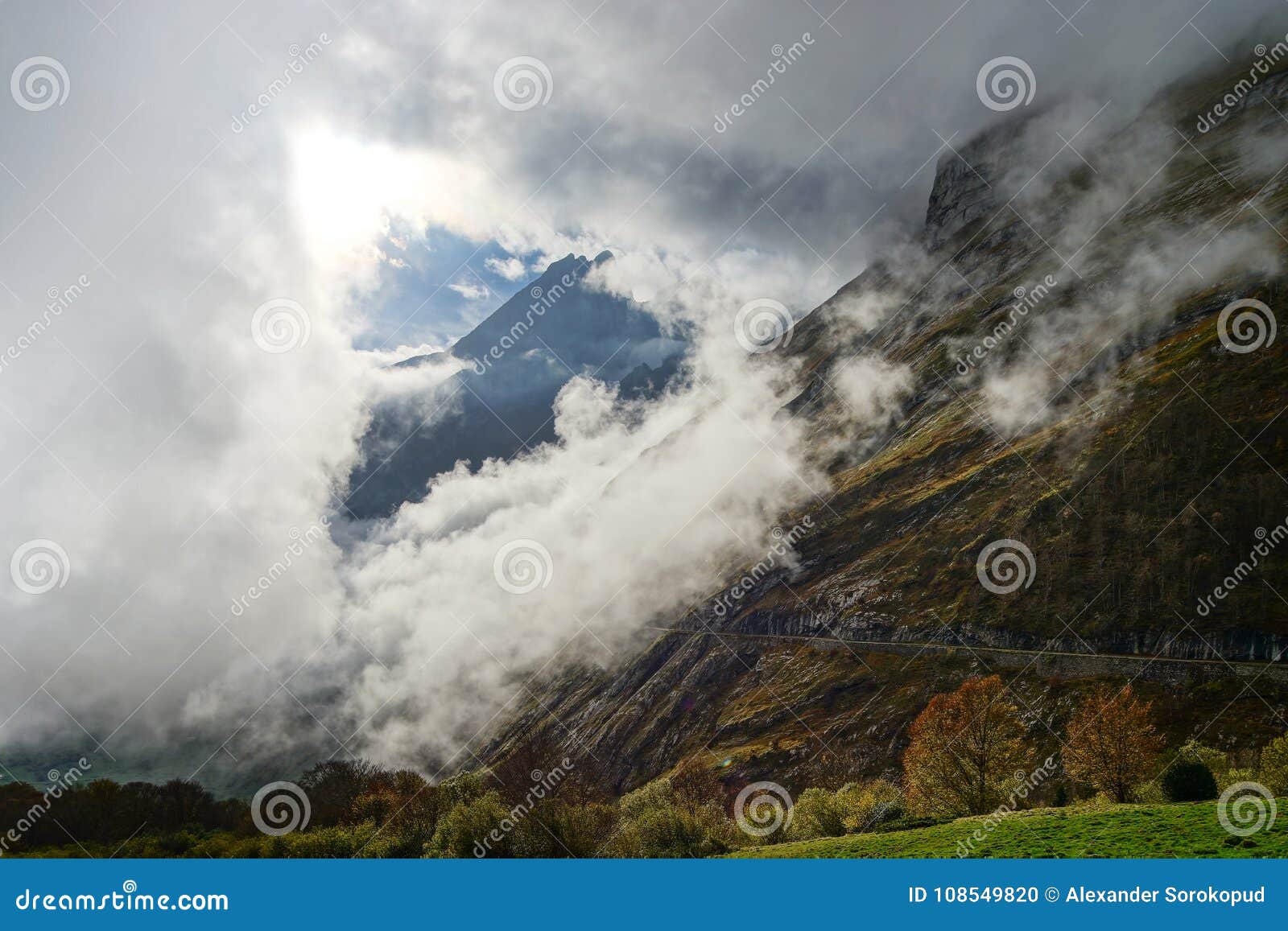 Sun Rays Lighting through the Clouds in High Pyrenees Stock Photo ...