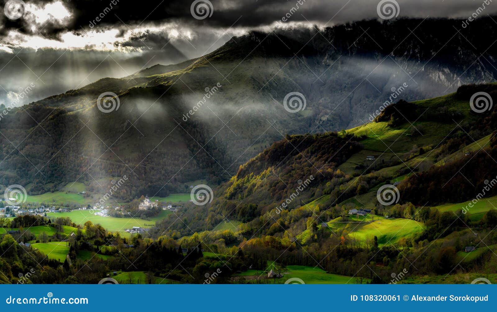 Sun Rays Lighting through the Clouds in High Pyrenees, Sunrise, Stock ...