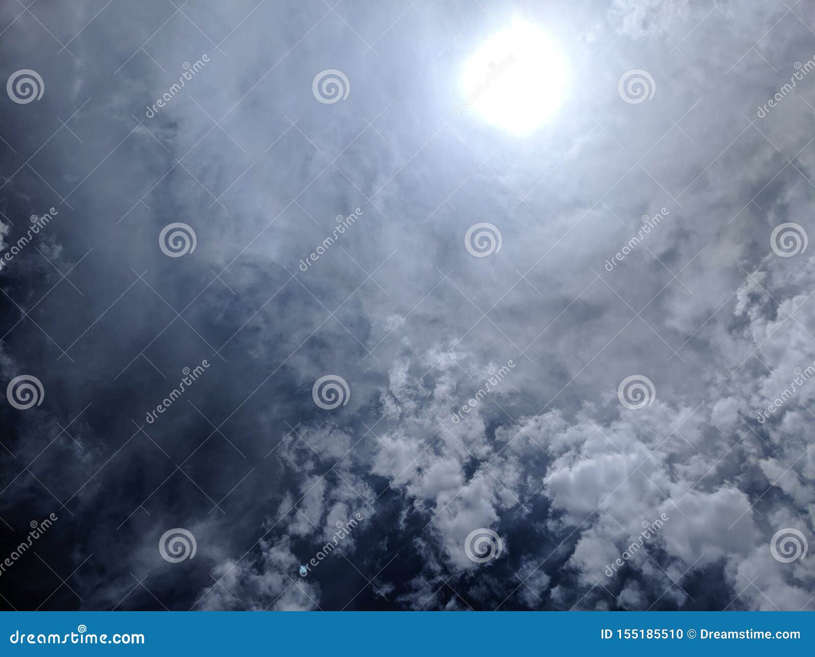 Sun Rays through Misty Clouds Stock Photo - Image of misty, sunrays ...