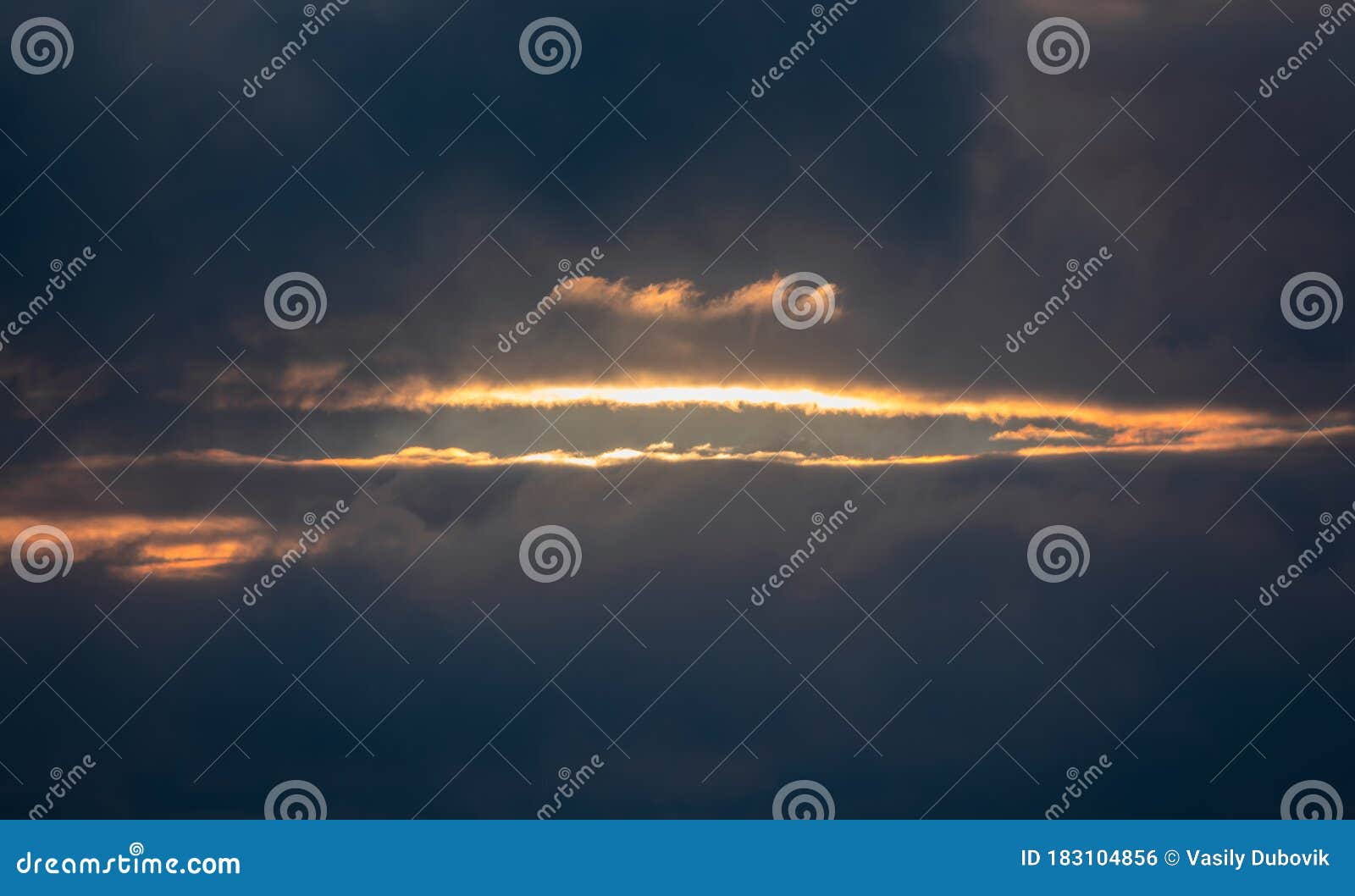 Sun Rays Passing through Clouds in Stormy Weather during Sunset Stock ...