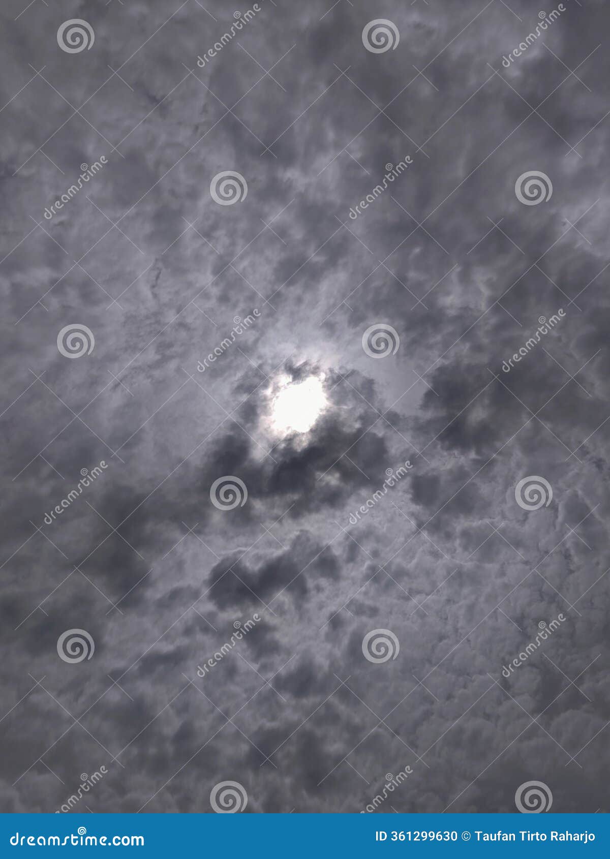 Sun Rays Pierce through Dark, Textured Clouds in a Dramatic Sky. High ...