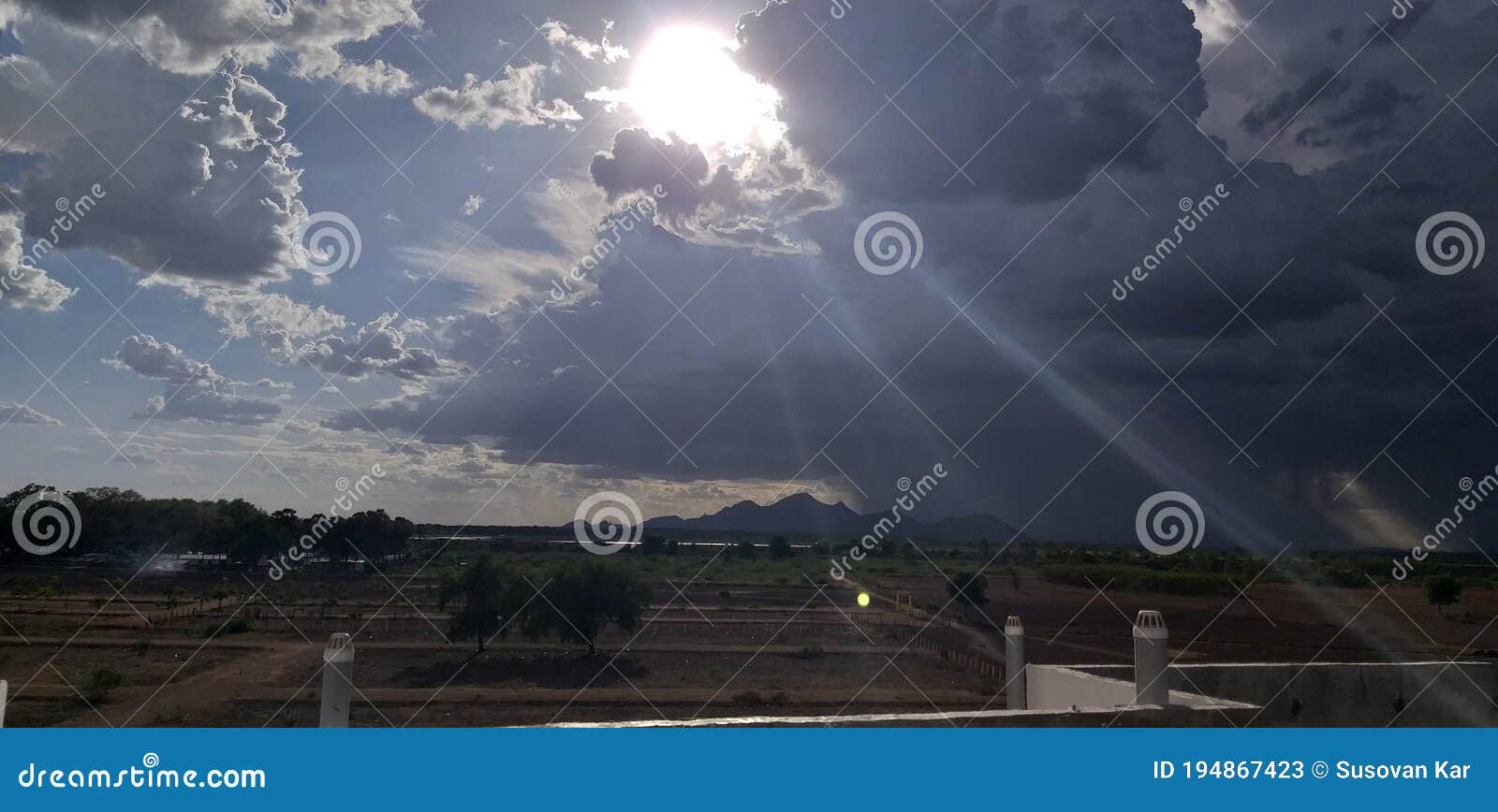 Sun Rays are Reflecting through Dark Clouds. Stock Image - Image of ...