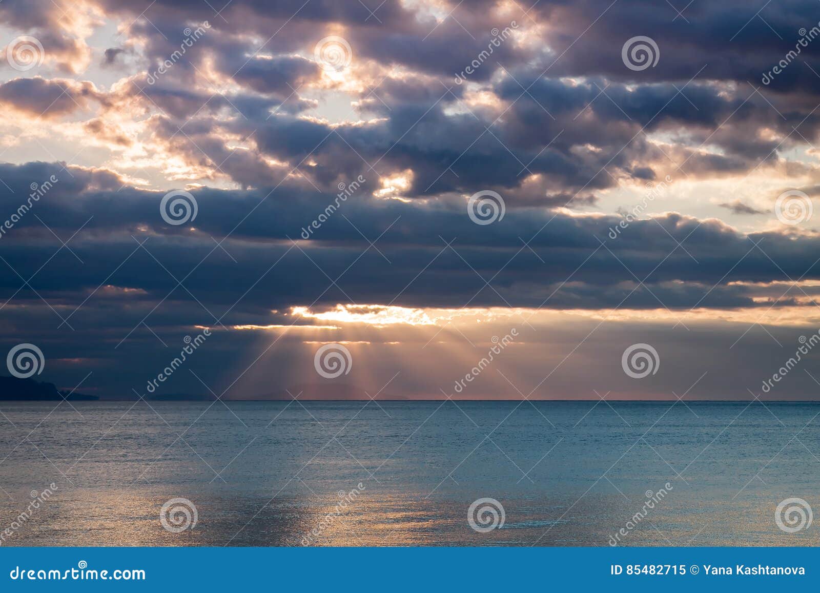 Sun rays at the sea stock image. Image of sunrise, lake - 85482715
