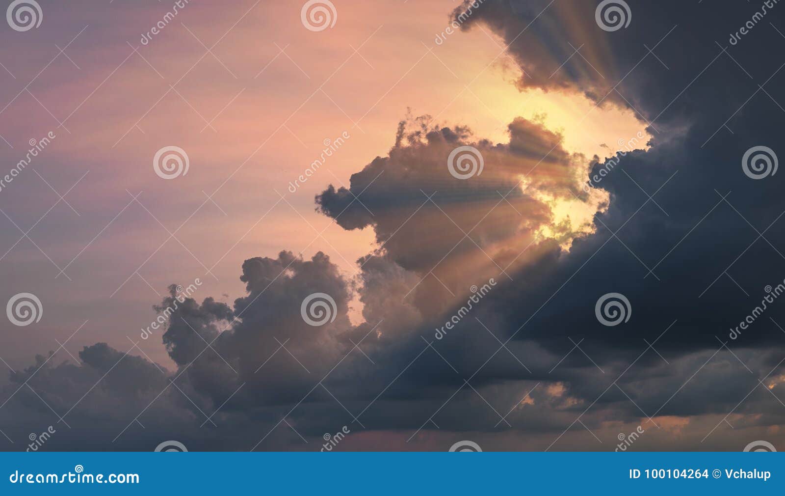 Sun Rays Shining through Beautiful Rain Clouds at Dusk. Dramatic ...
