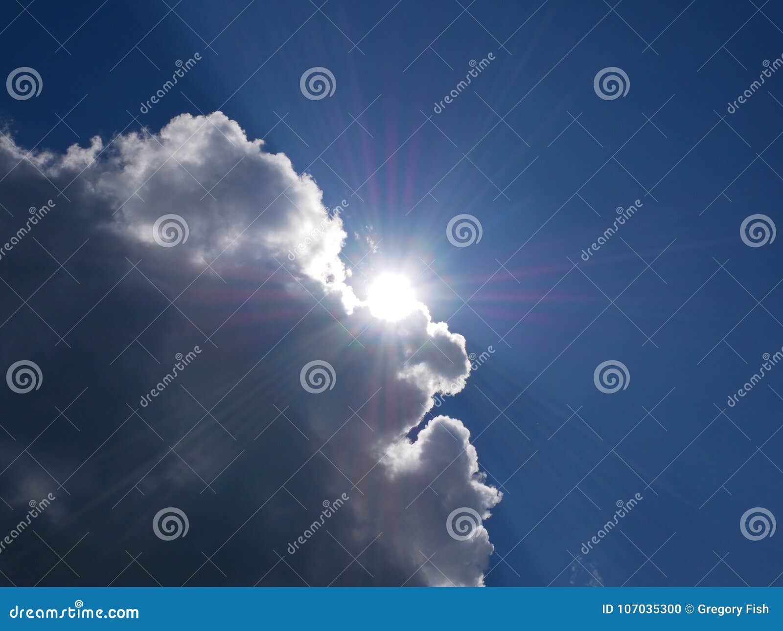 Sun Rays Shining from Behind the Clouds. Stock Photo - Image of cloud ...