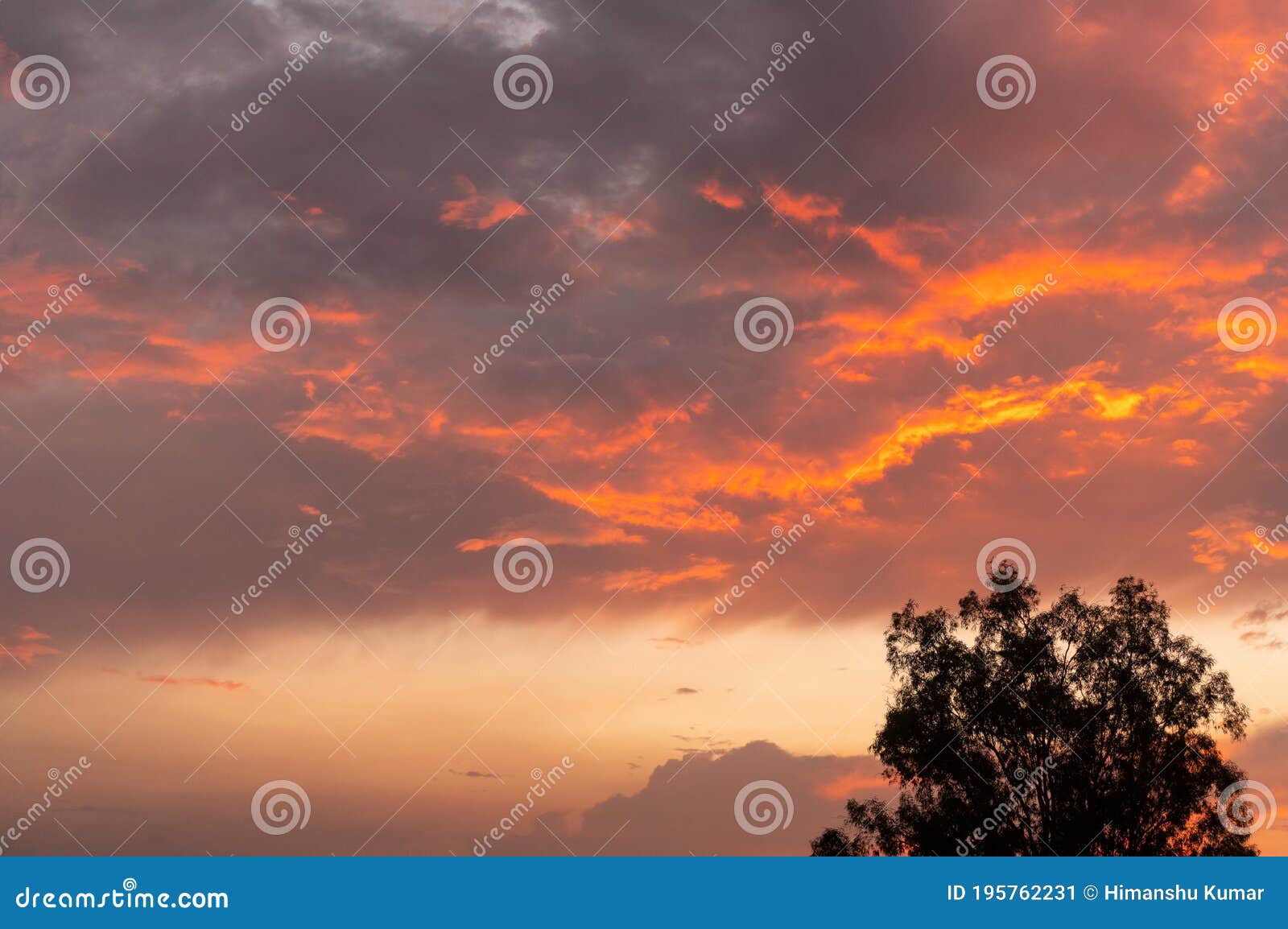 Sun Rays from the Thick Black Clouds at Sunset Stock Image - Image of ...